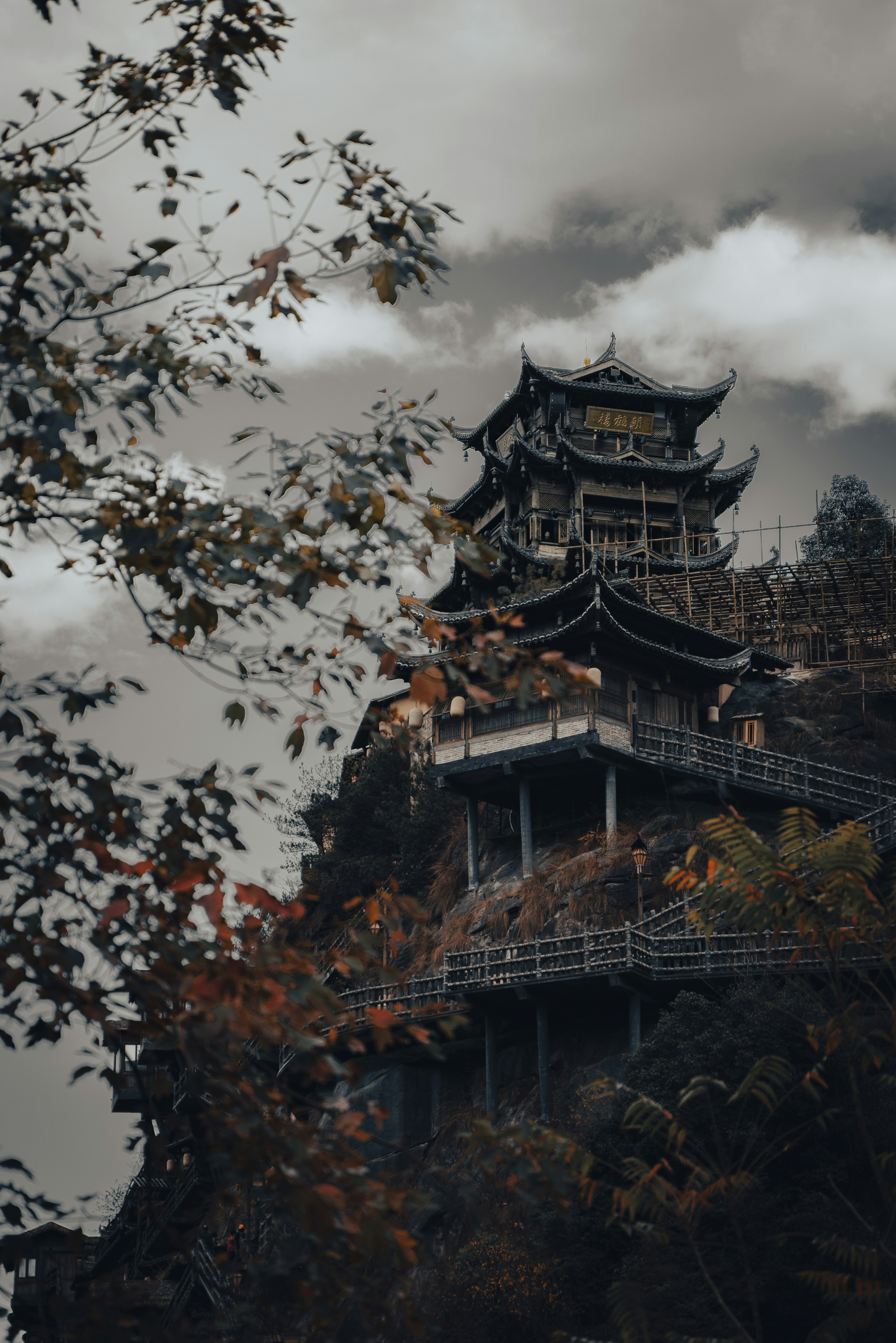 A tall pagoda with trees around it photo – Free Architecture Image on ...