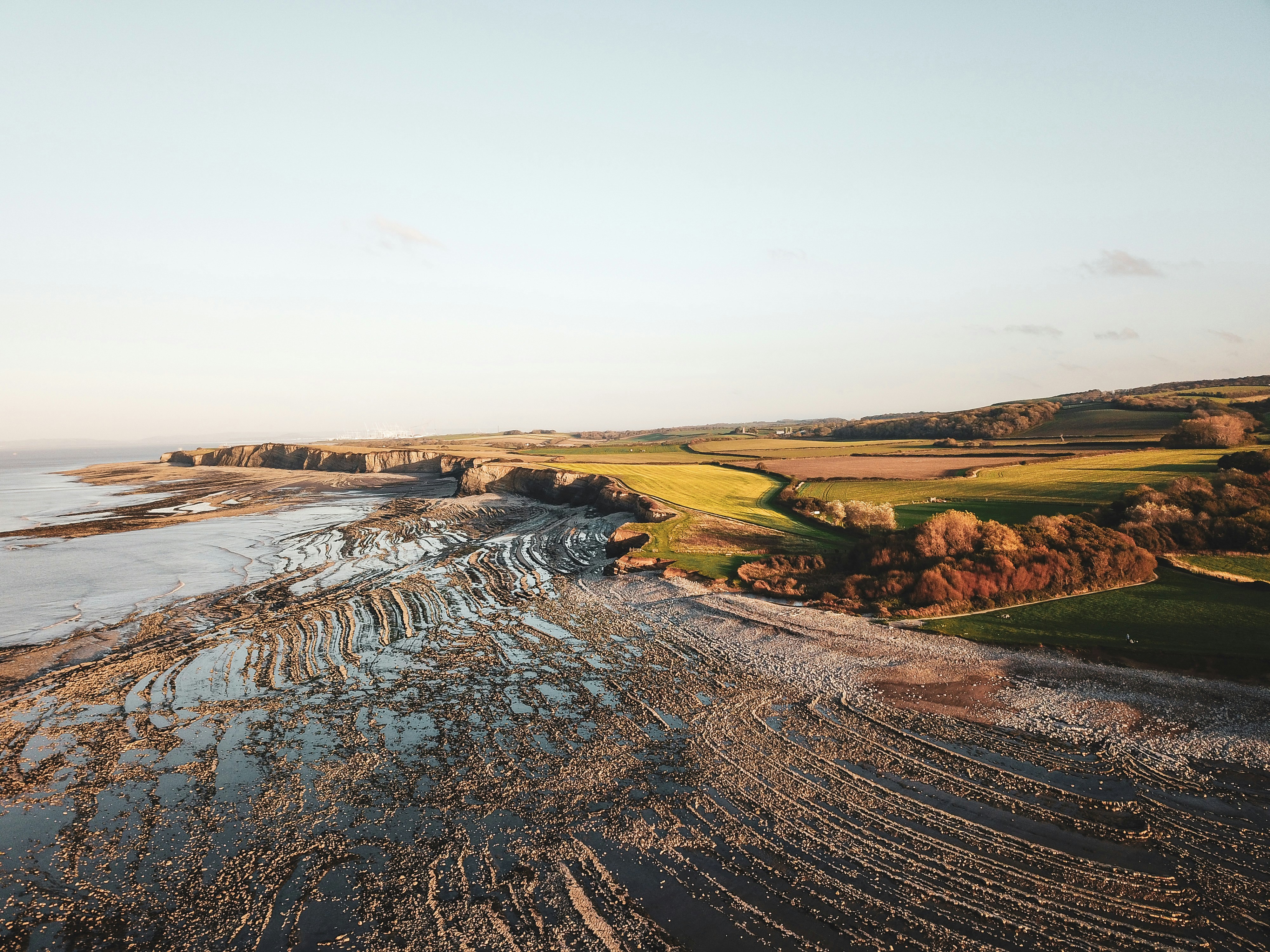 Tidal Lace and Emerald Fields at Dusk