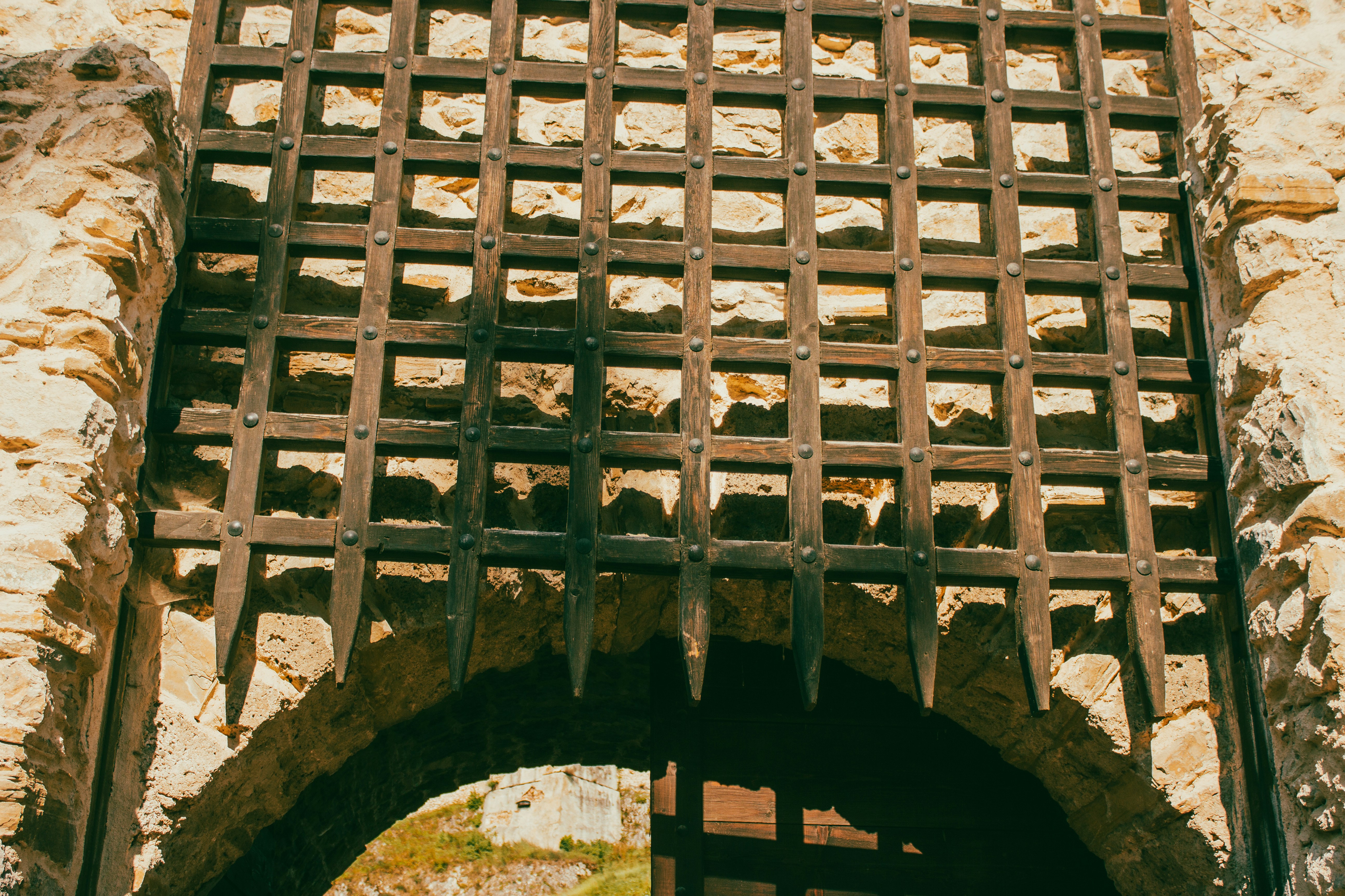 A metal gate with a hole in it photo – Free Open gates Image on Unsplash