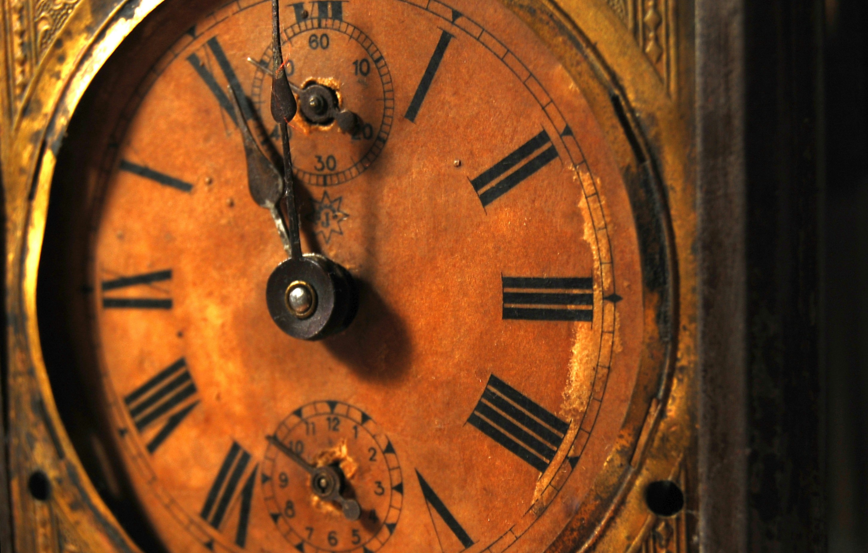 A clock on a wall photo – Free Old clock Image on Unsplash