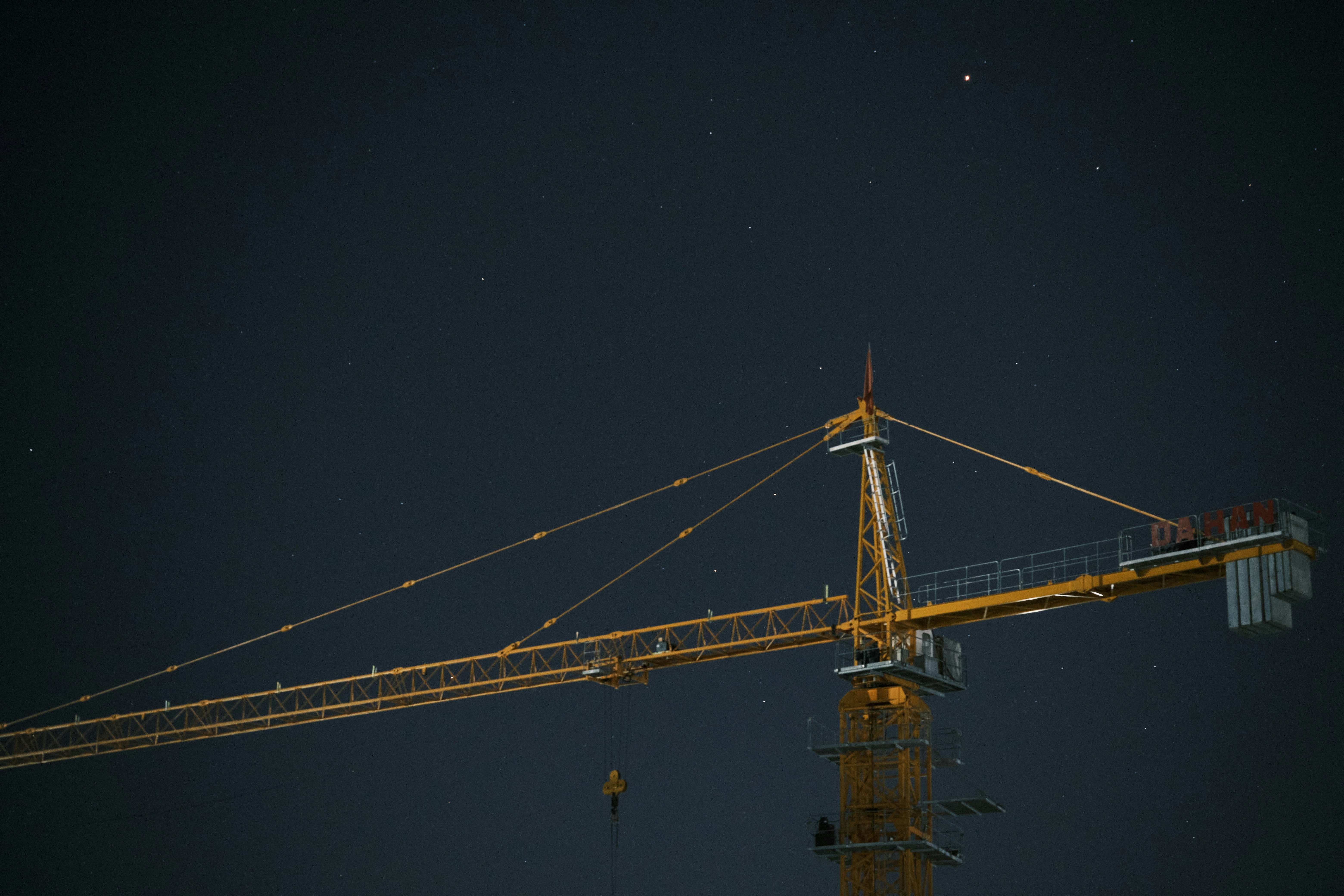 A large yellow crane at night photo – Free Huairou Image on Unsplash