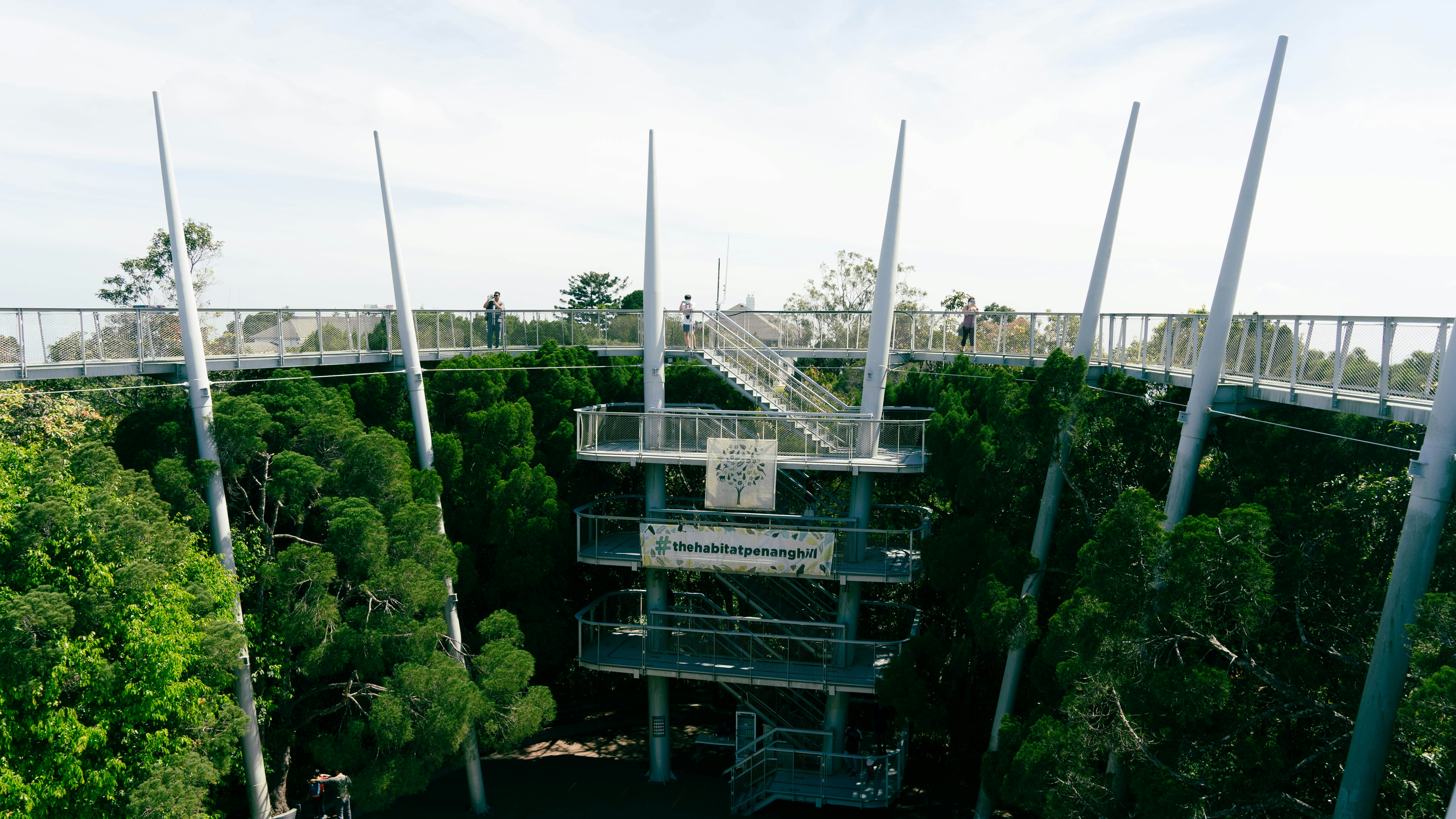 A roller coaster going over a bridge photo – Free The habitat penang ...