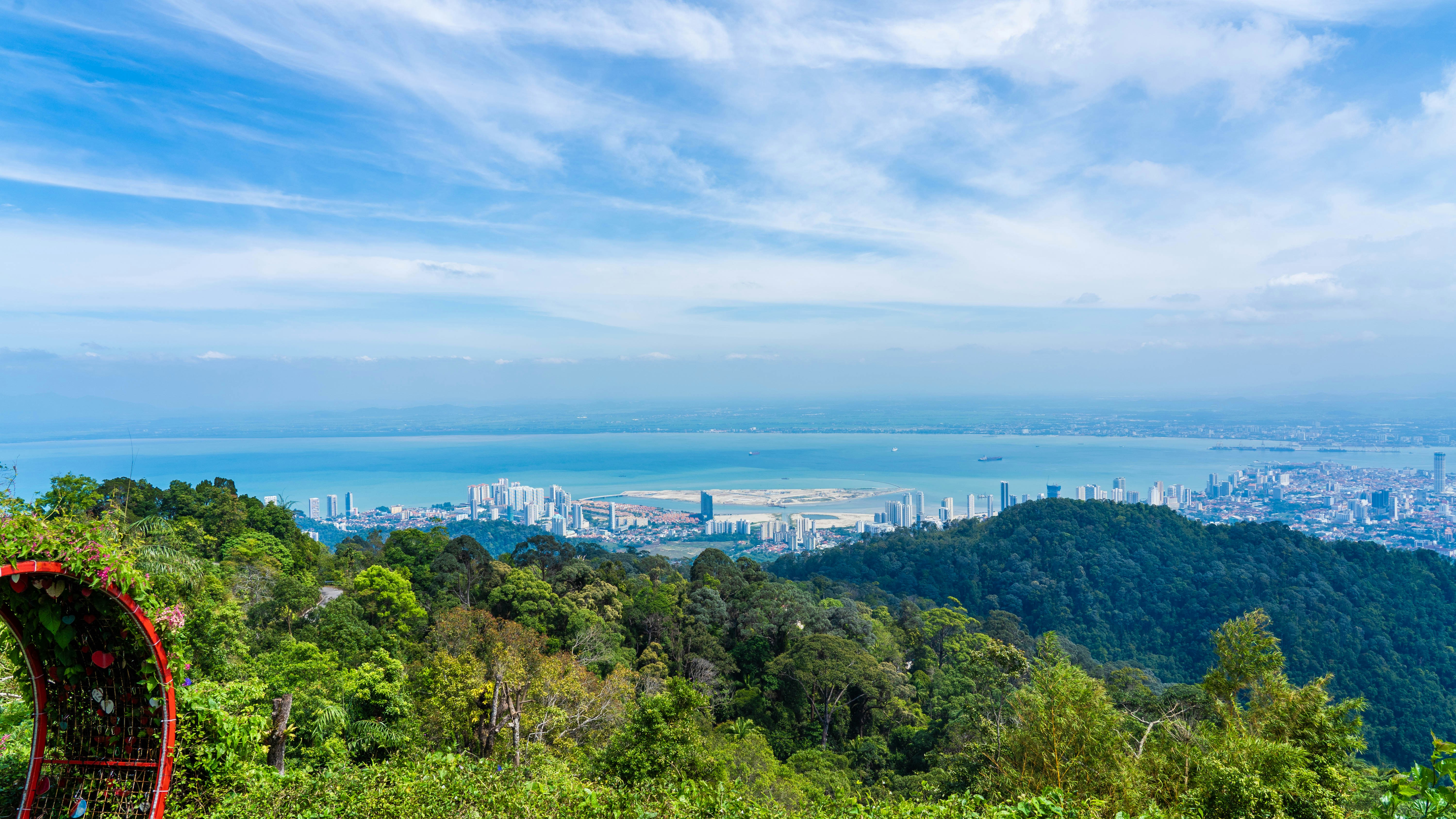 Coastal City Horizon Between Lush Hills
