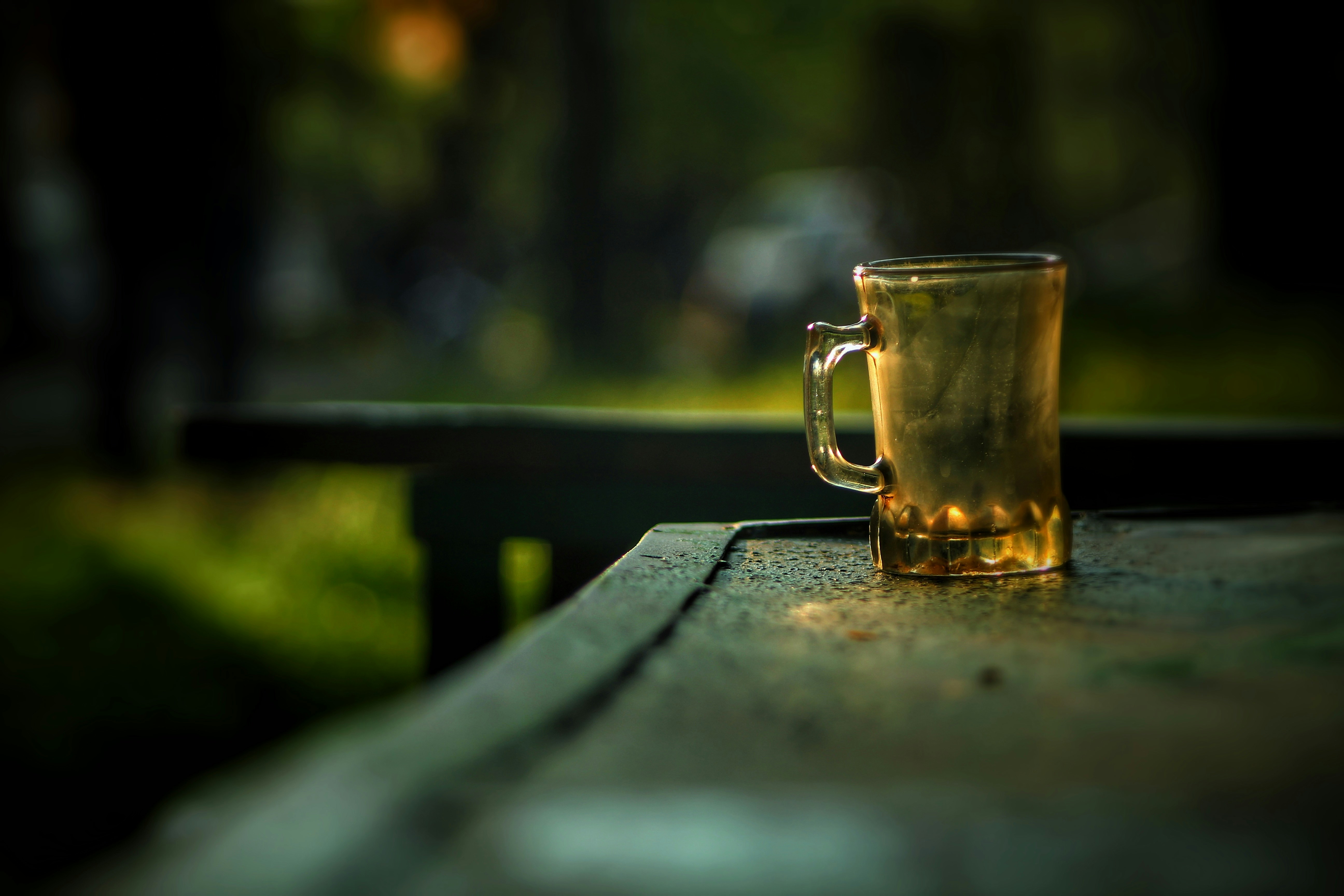 Sunlit Amber on a Weathered Table