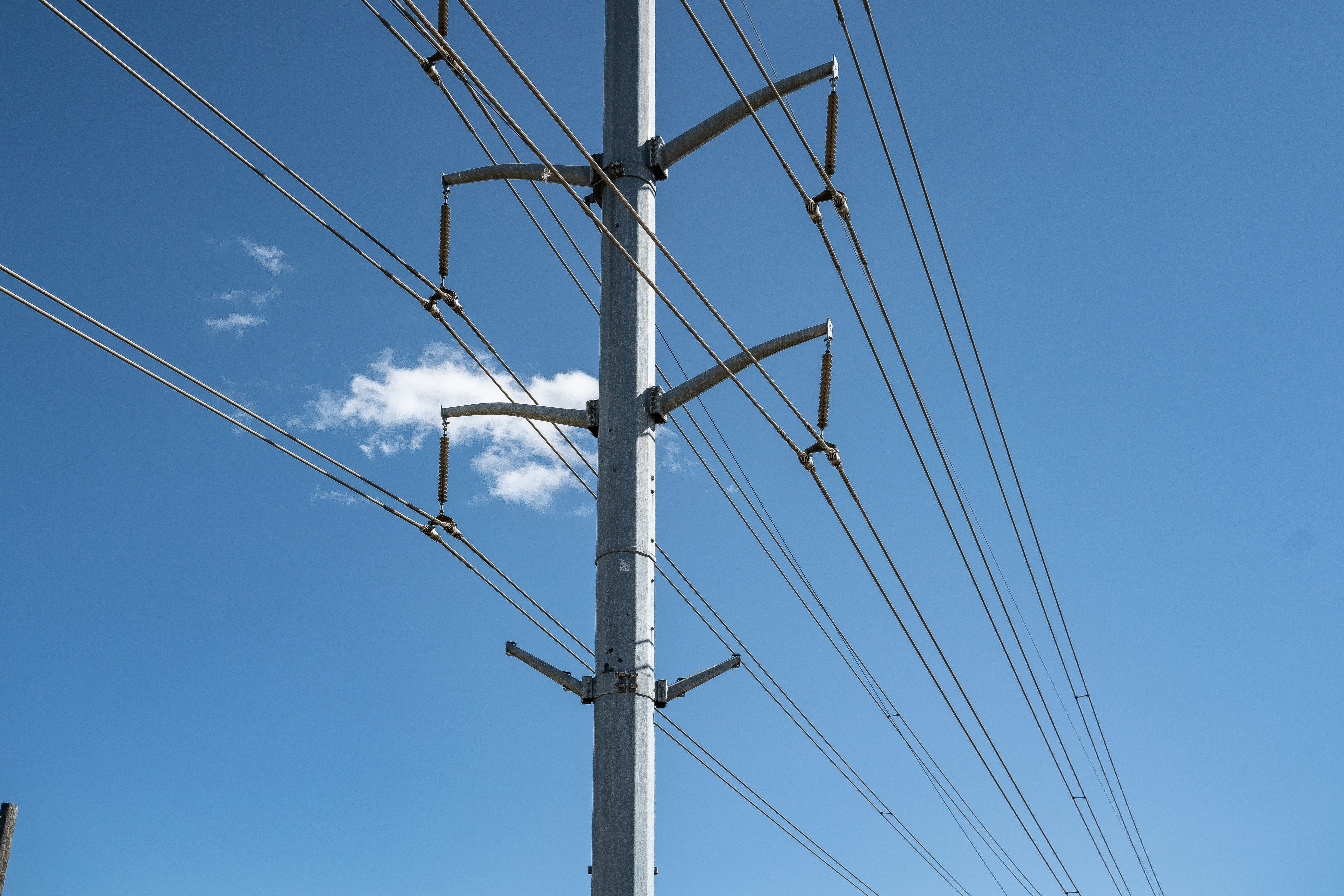 A power line with many wires photo – Free Utility pole Image on Unsplash