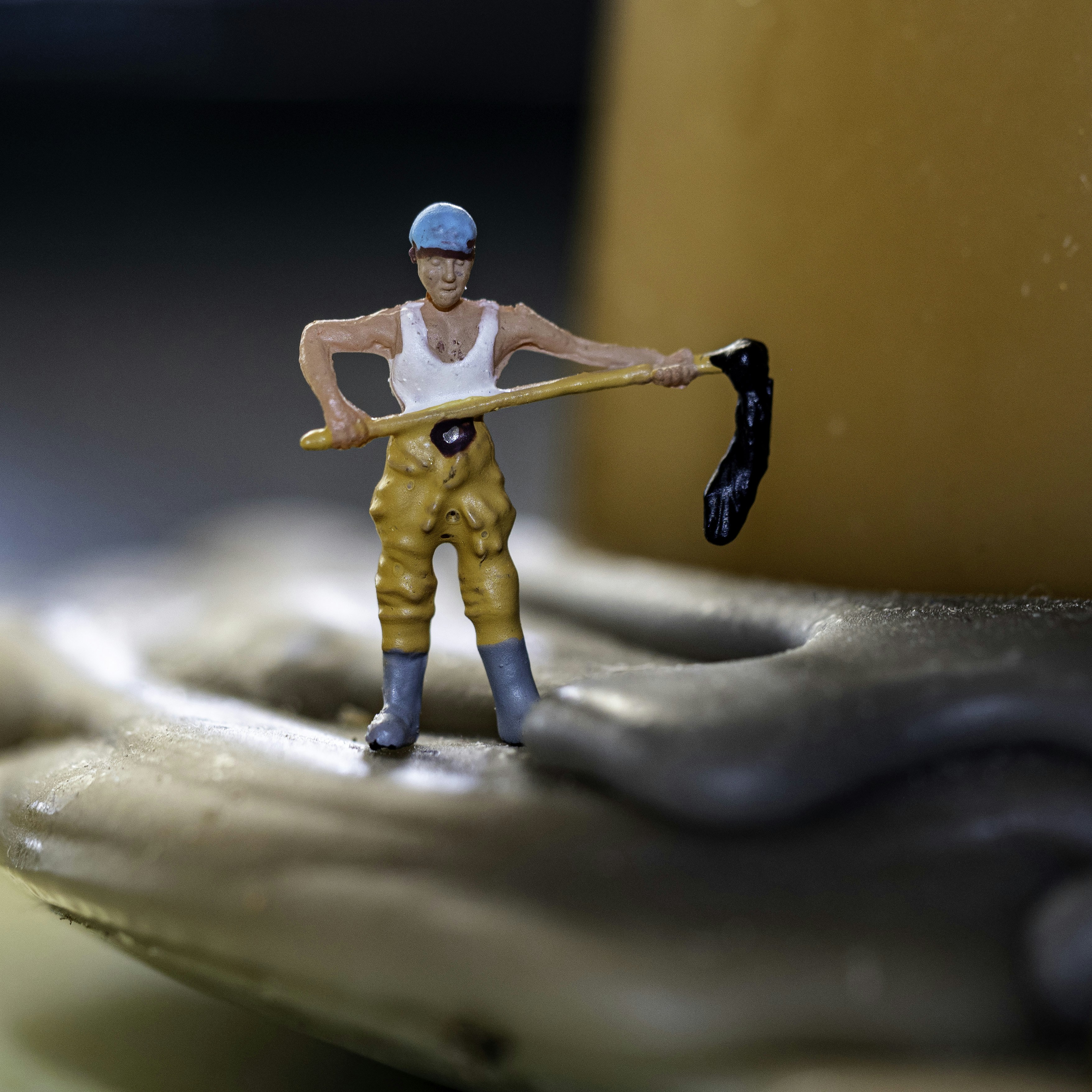 Tiny Steel-Headed Oarsman on a Giant Dock