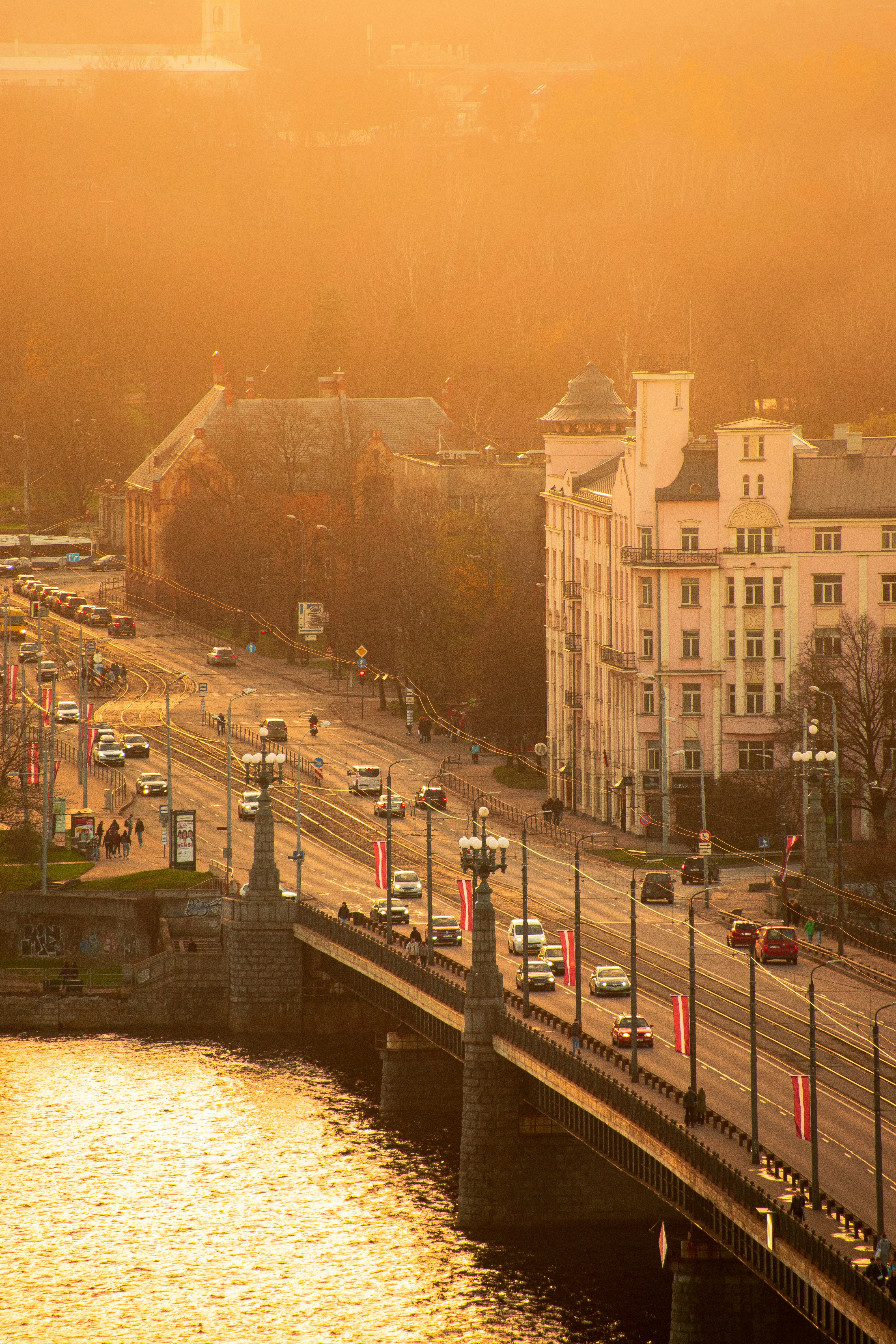 A city street with cars and buildings photo – Free Riga Image on Unsplash