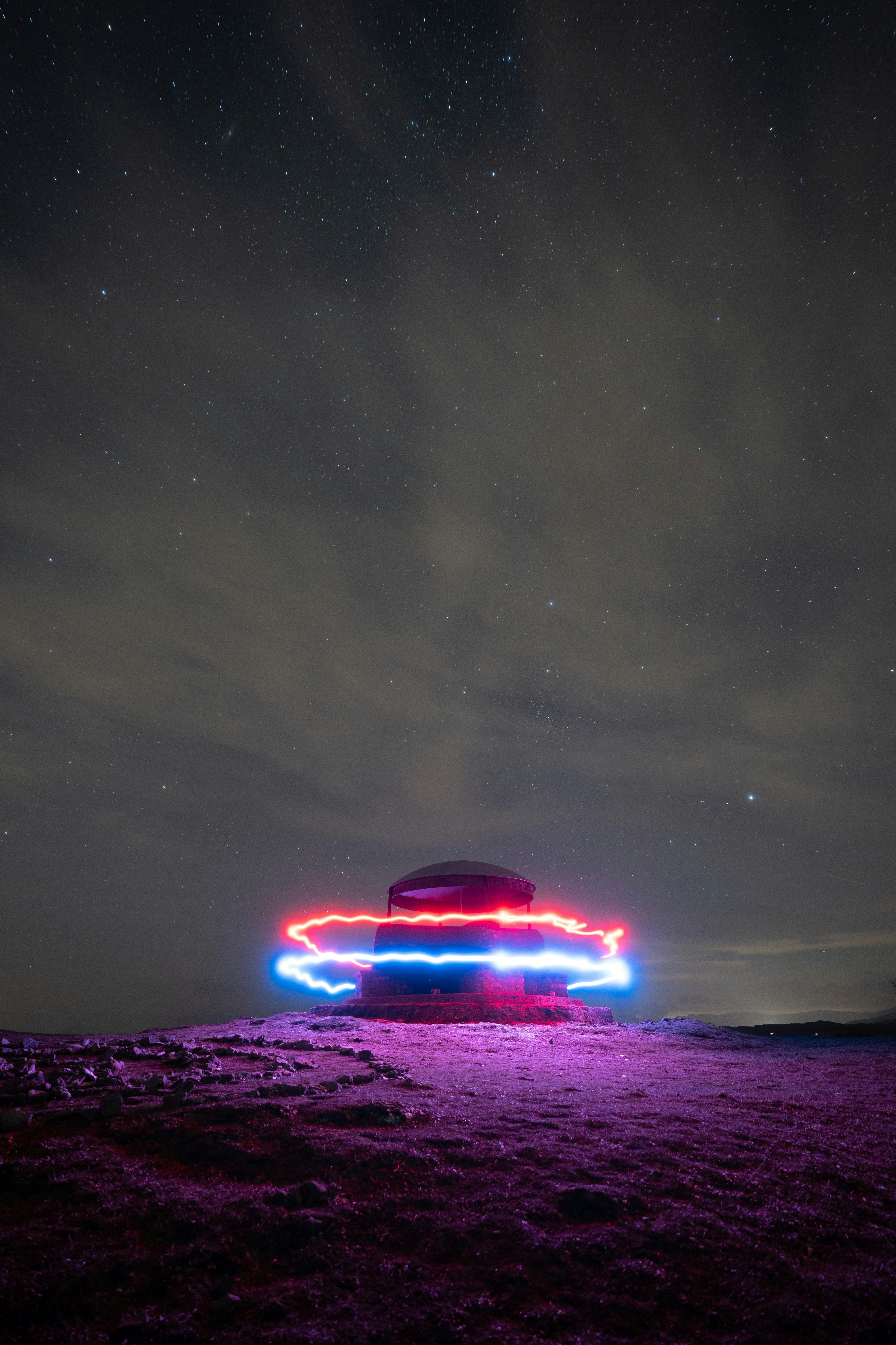 Neon Halo Over a Desert Dome: Long-Exposure Nightscape