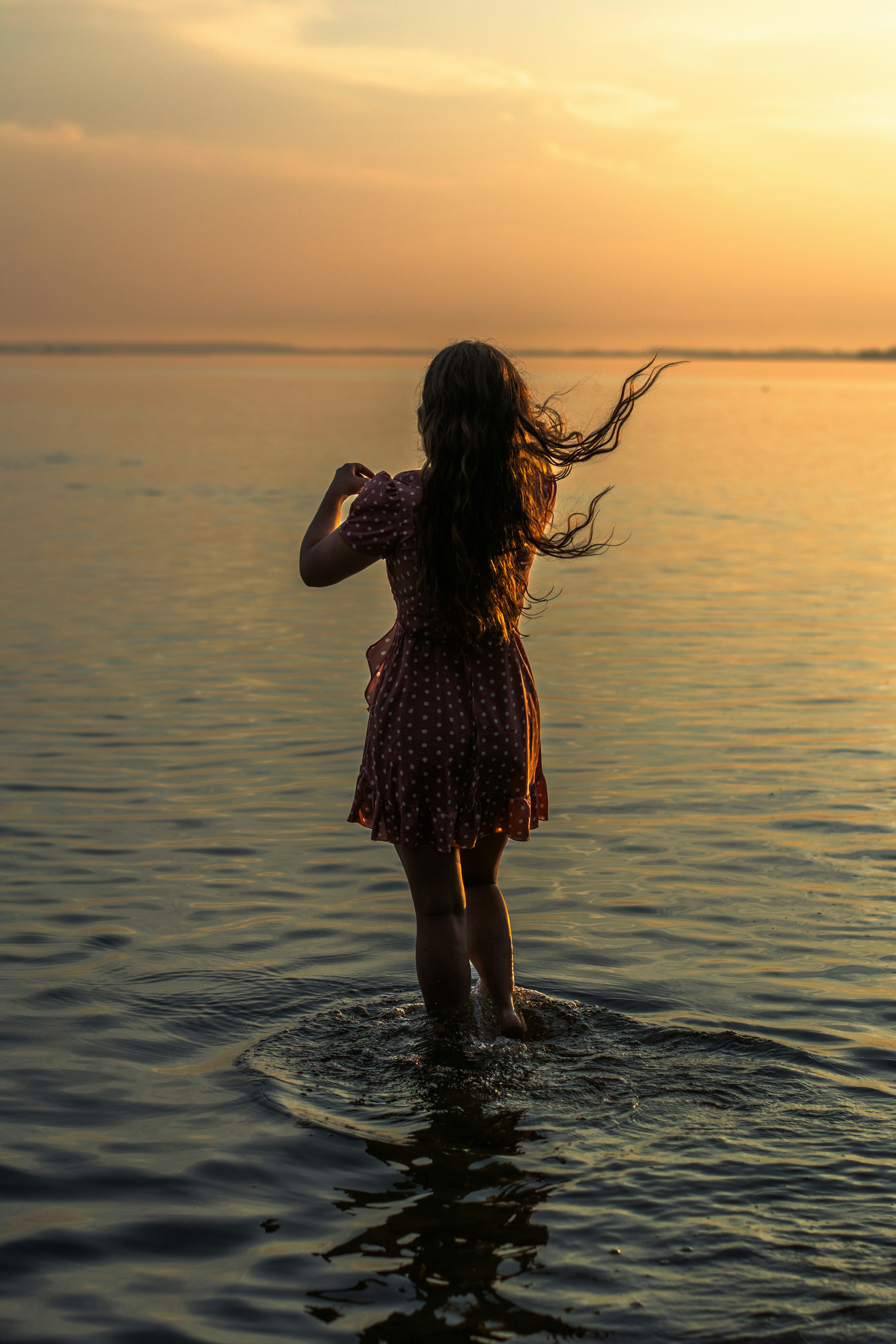 A person standing in water photo – Free Girl Image on Unsplash