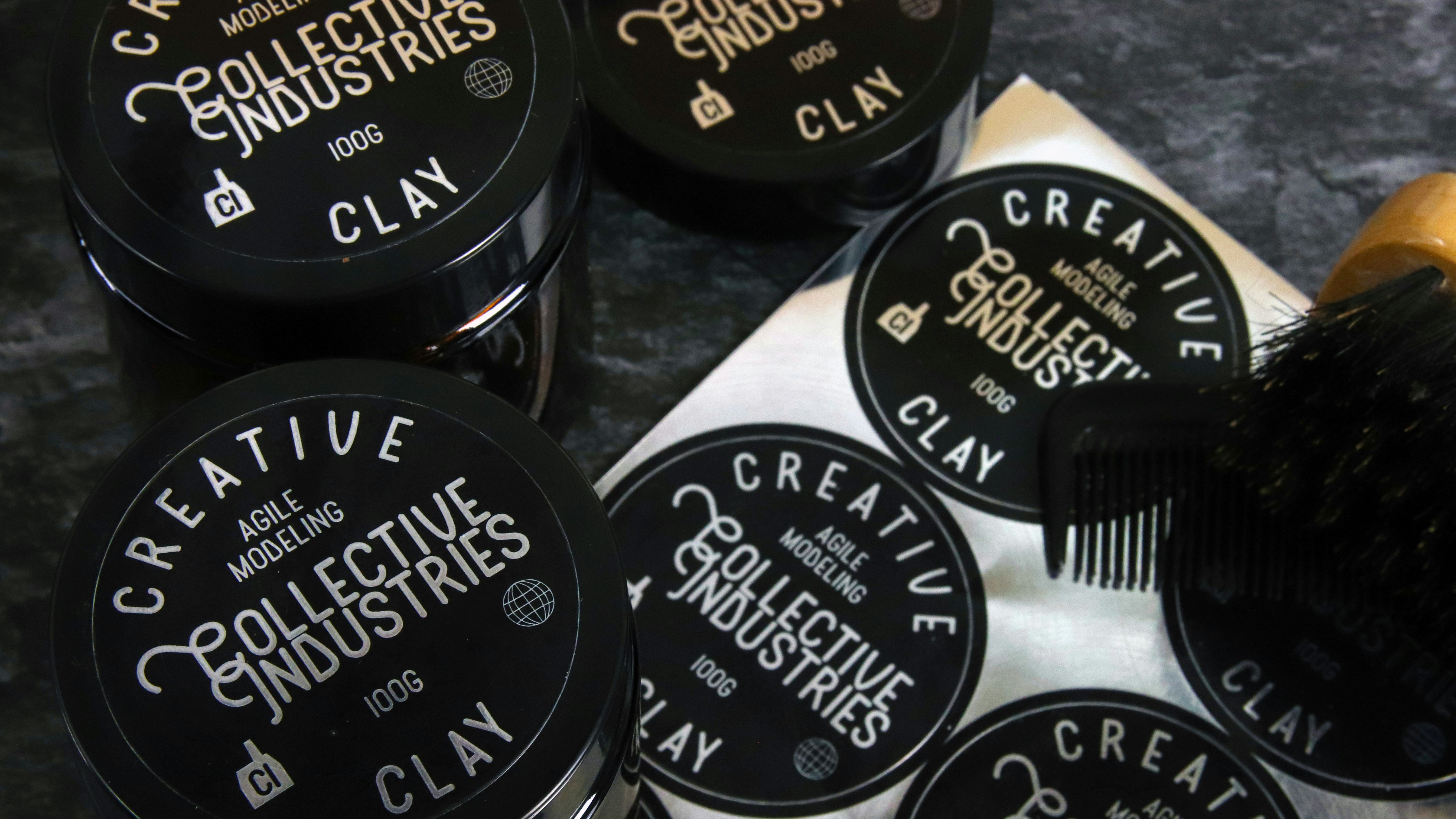 Circle mirror silver hair care labels applied to black tins