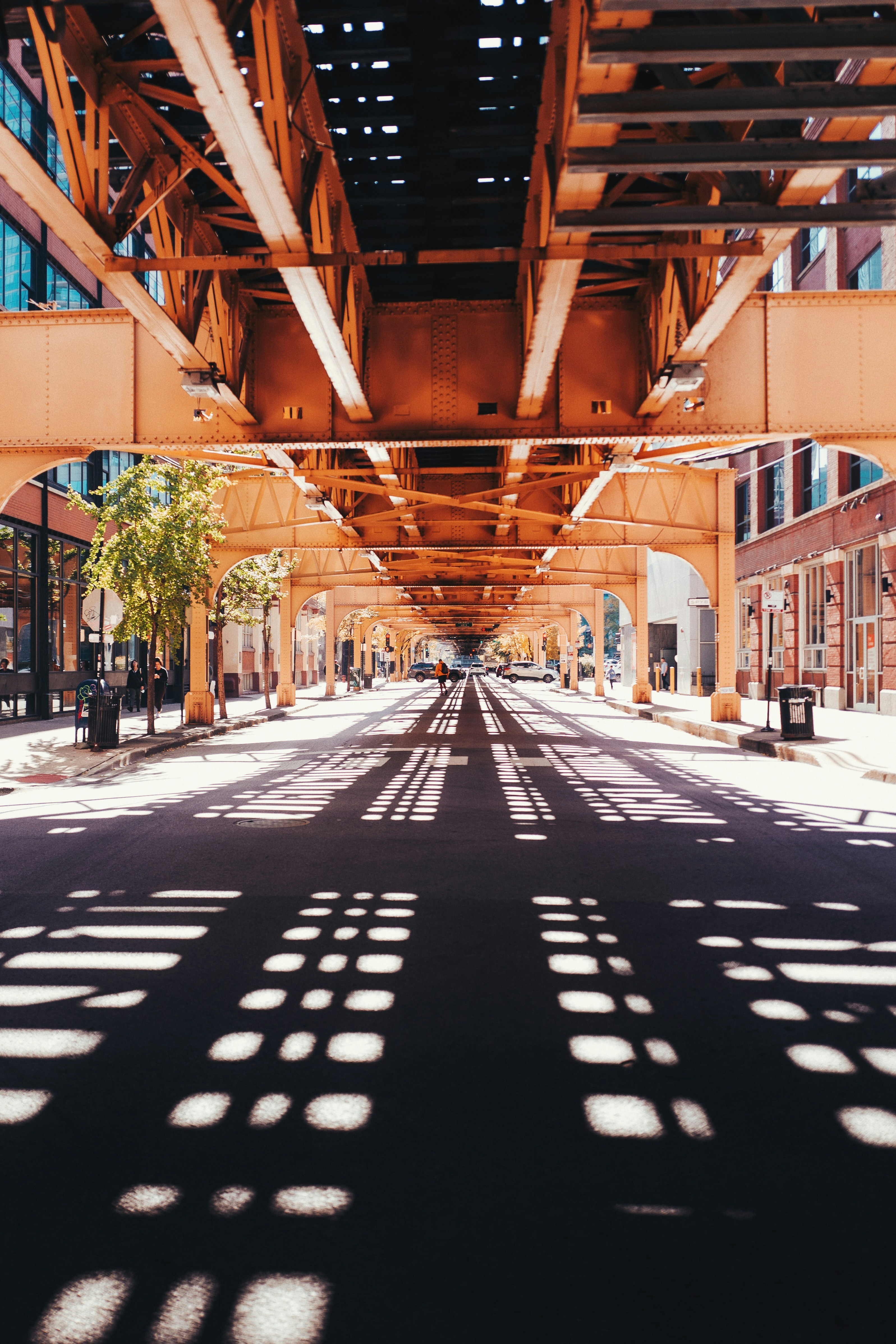 Vanishing Point Under the Orange Canopy: A Street Study