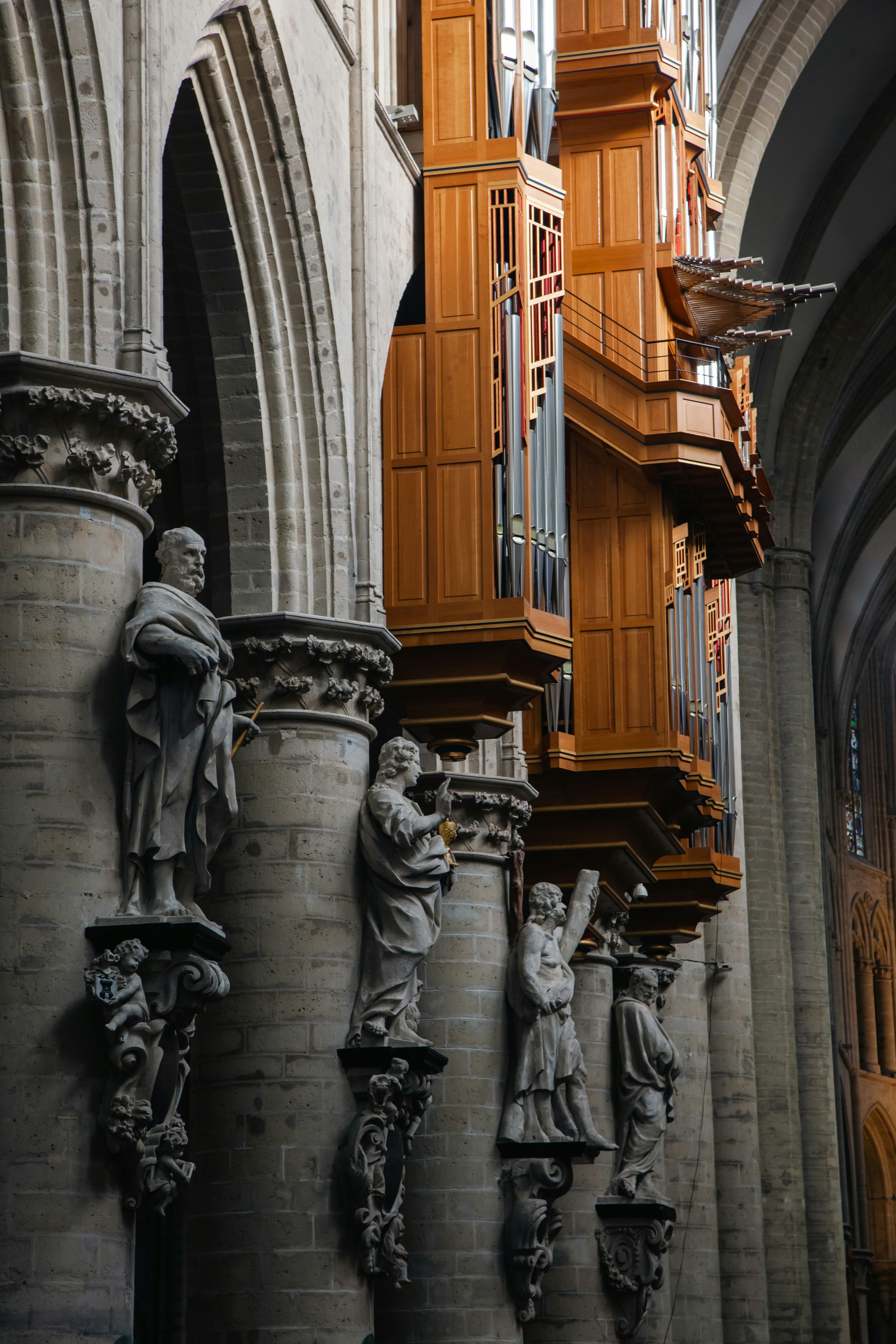 A group of statues in a building photo – Free Architecture Image on ...