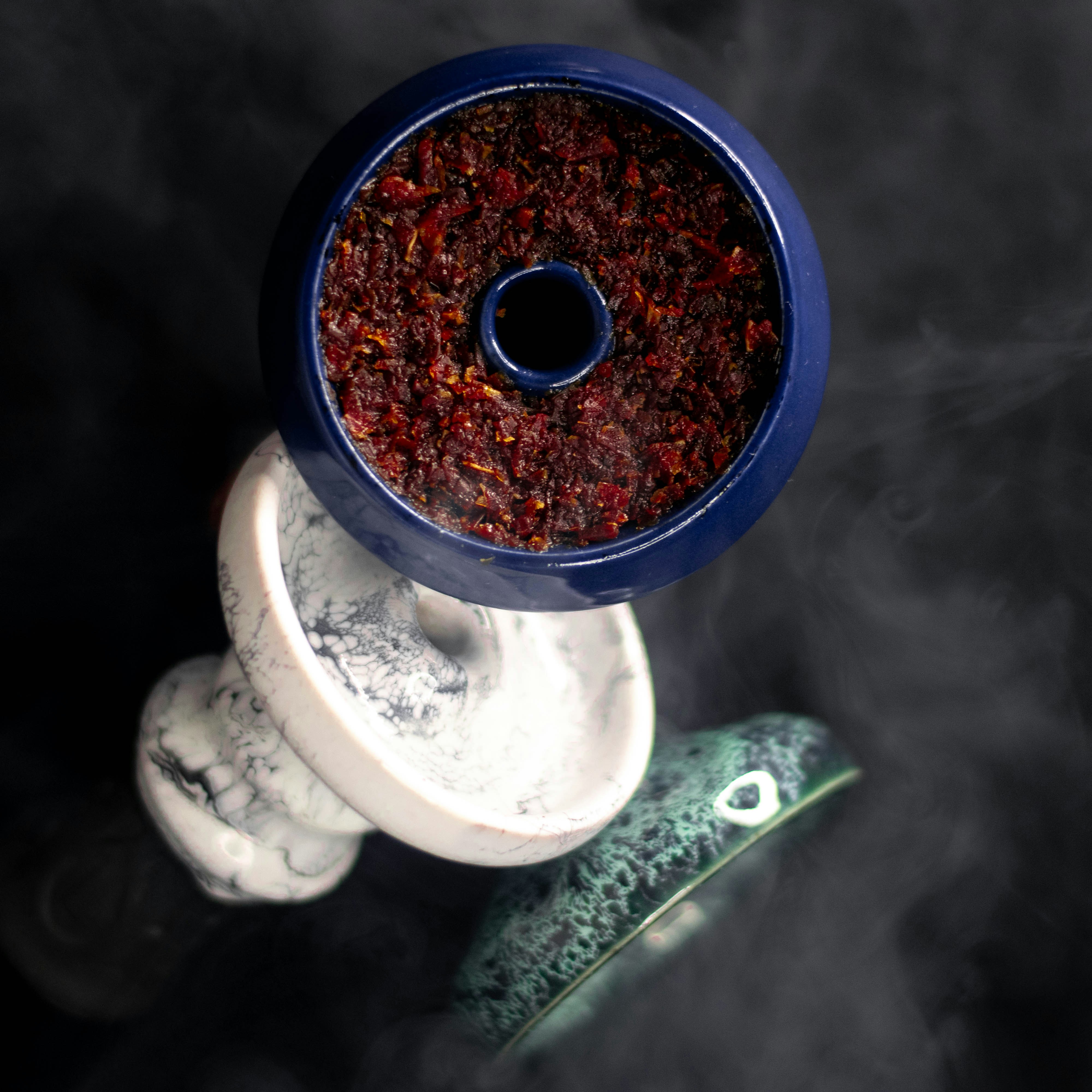Ember Crown Over a Blue Hookah Bowl