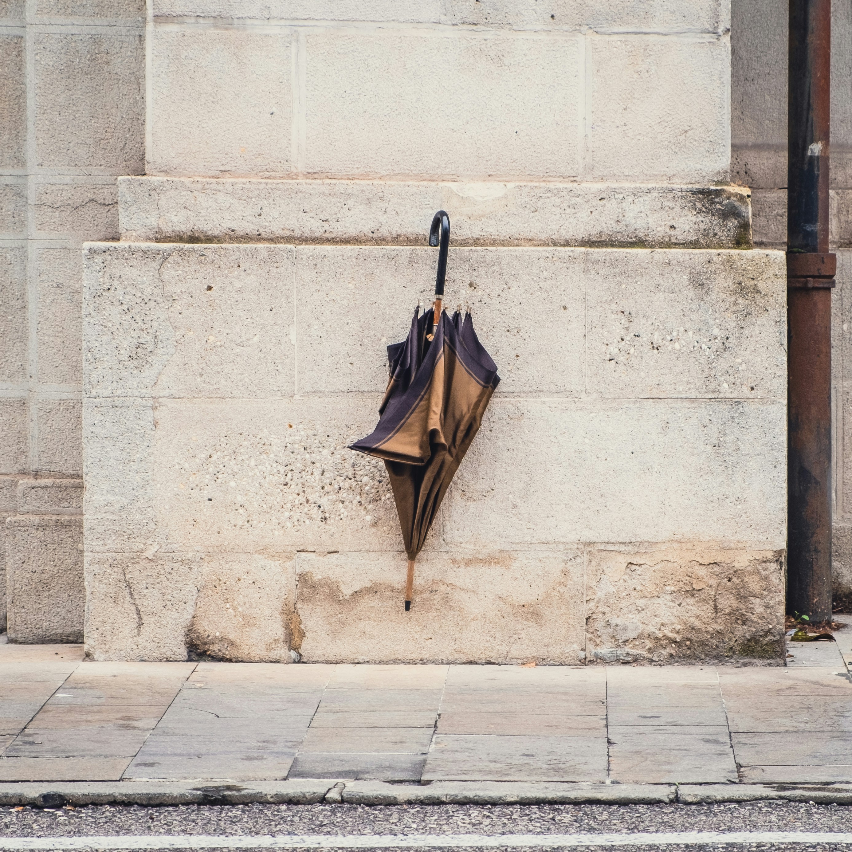 Umbrella Graces the Corner Stone