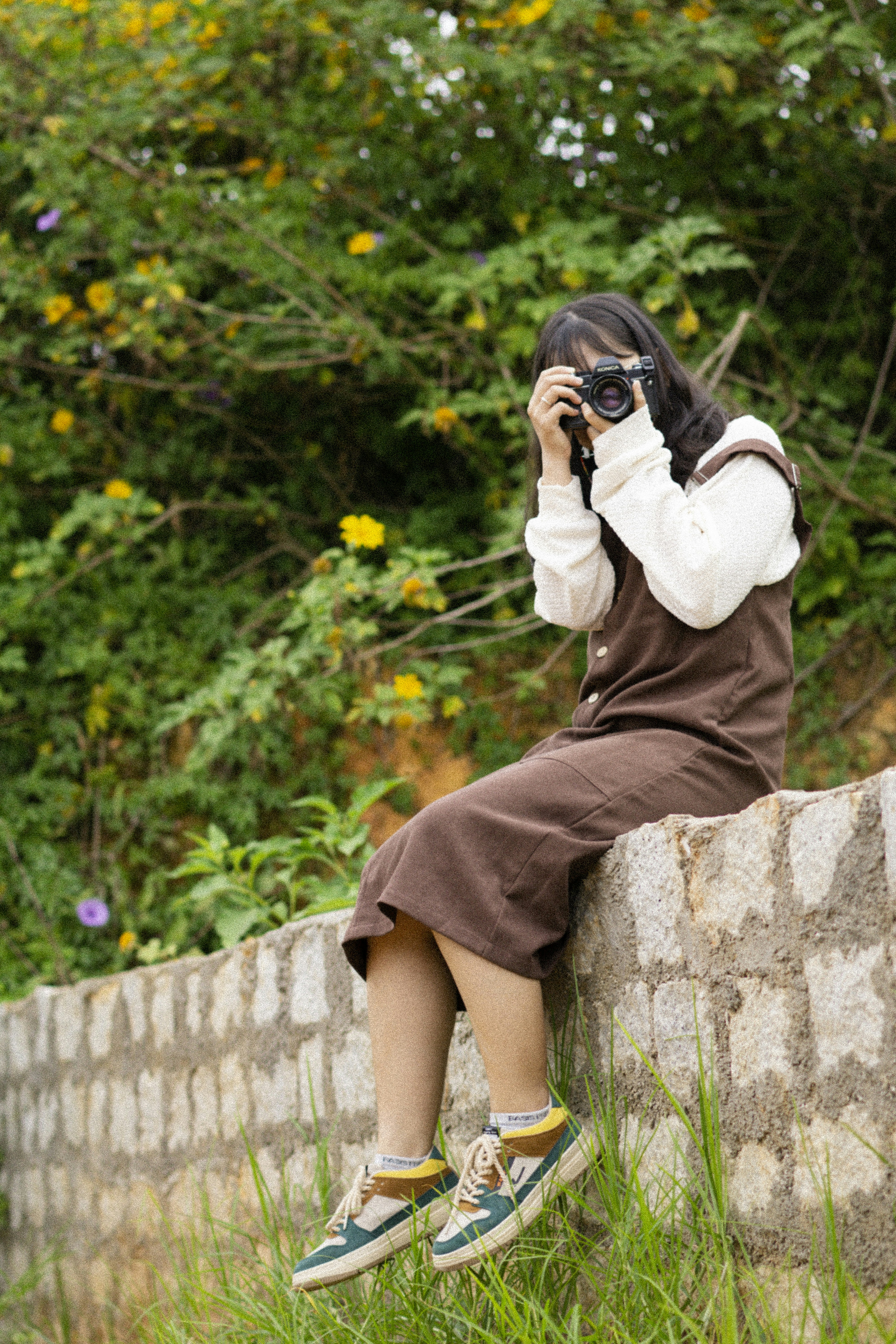 a person taking a picture with a camera