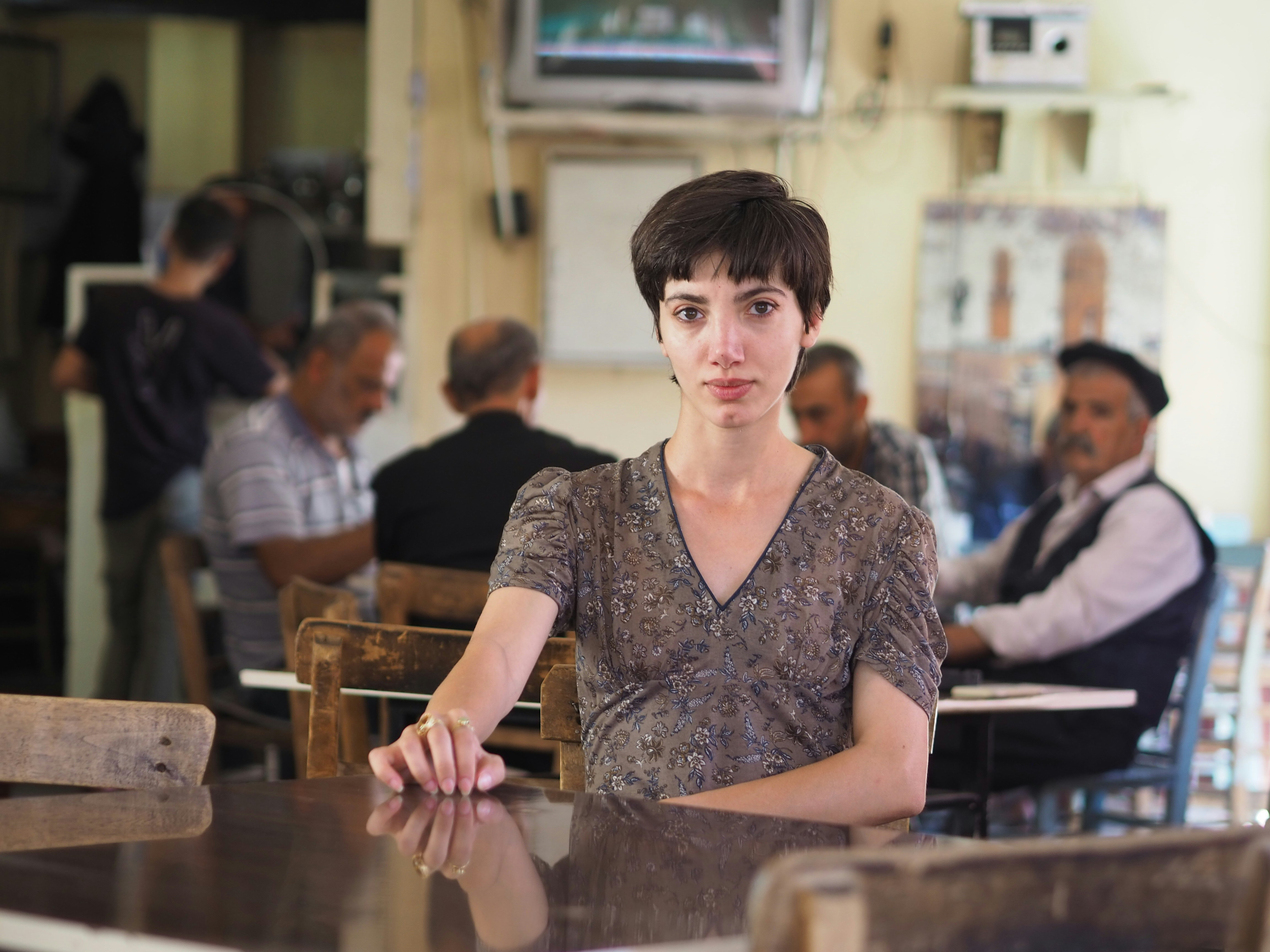 Contemplative Moments in a Busy Café