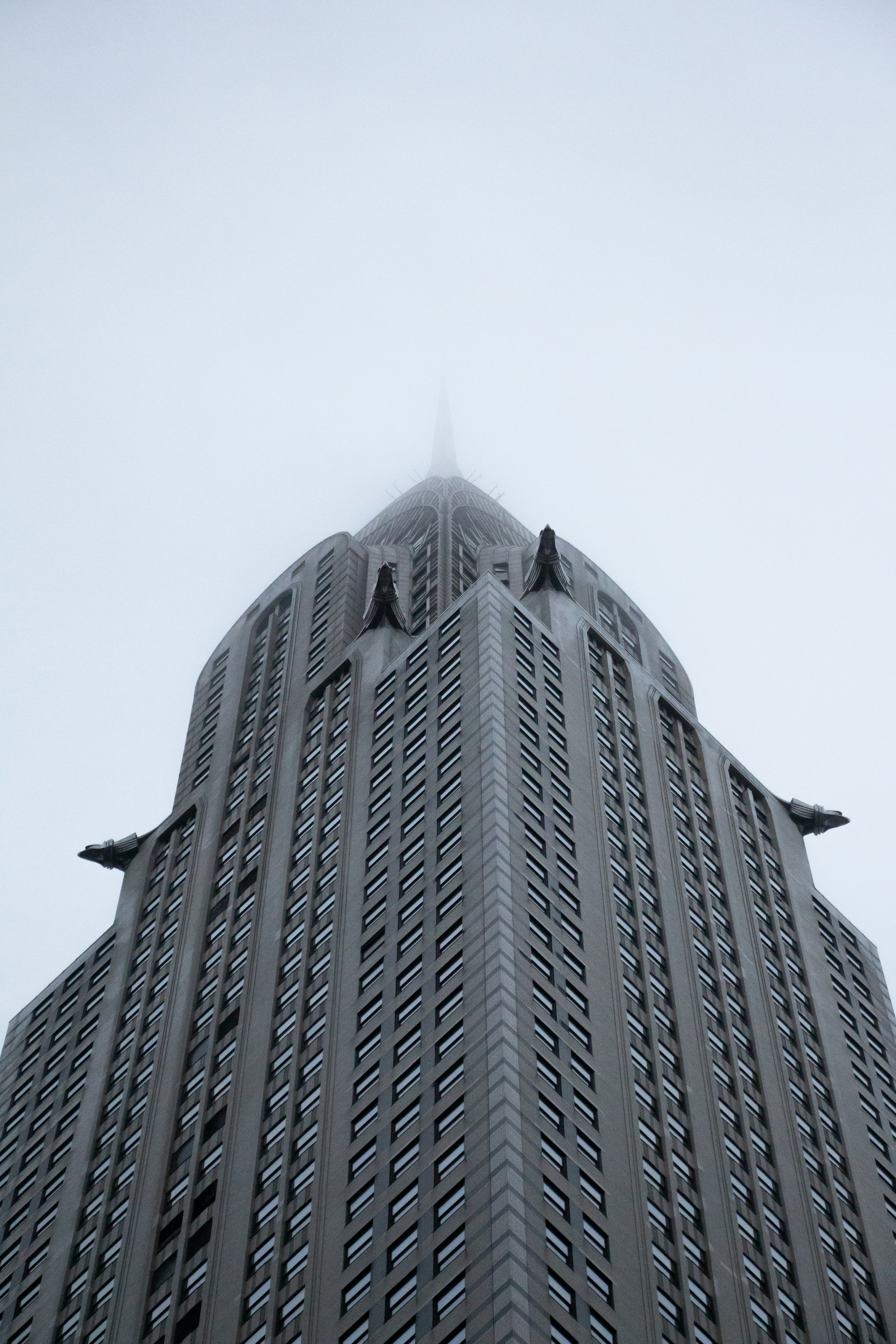 A tall building with a pointy top photo – Free Chrysler building Image ...
