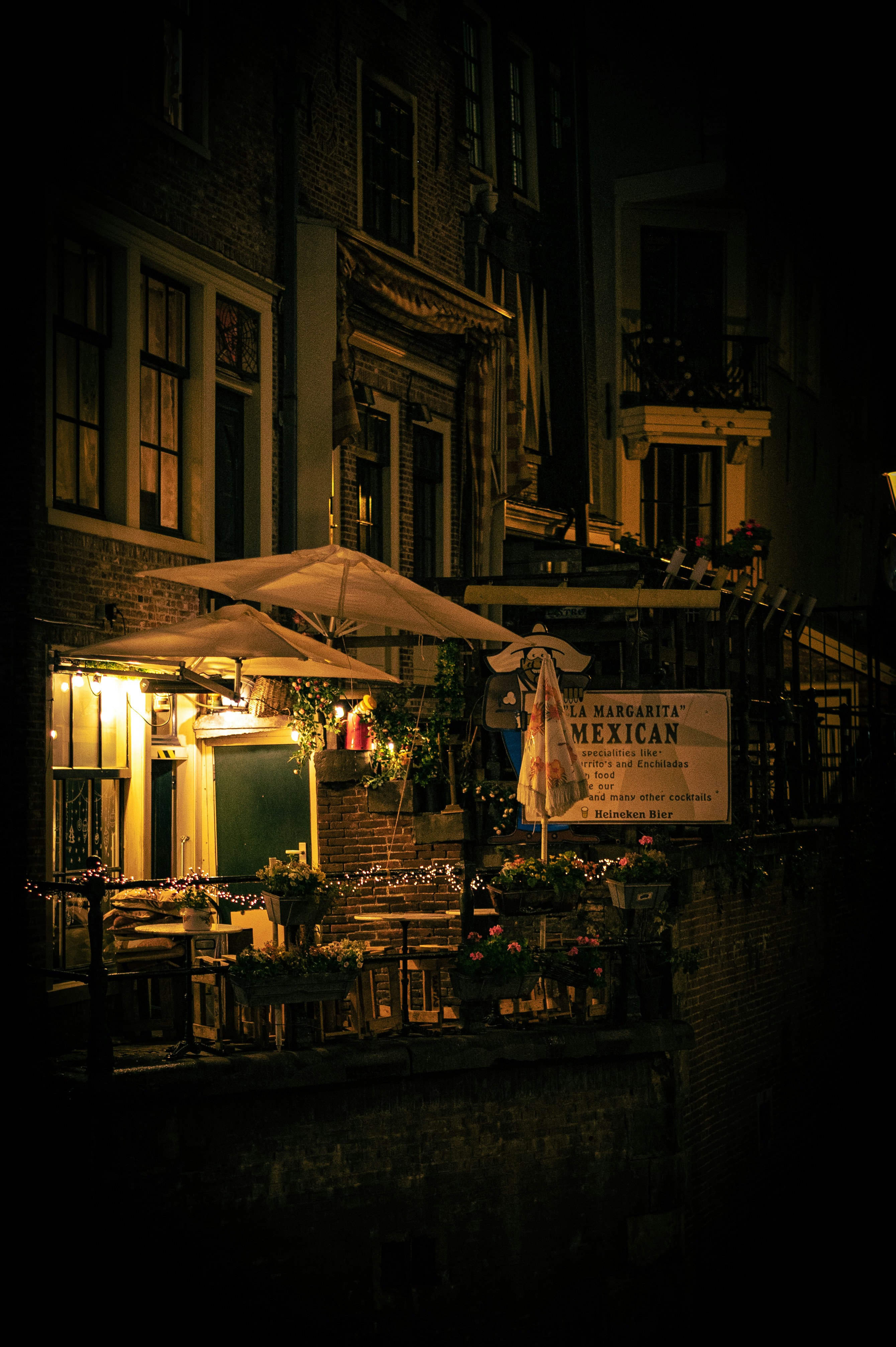 Warm Lanterns Over a Night Corner Café