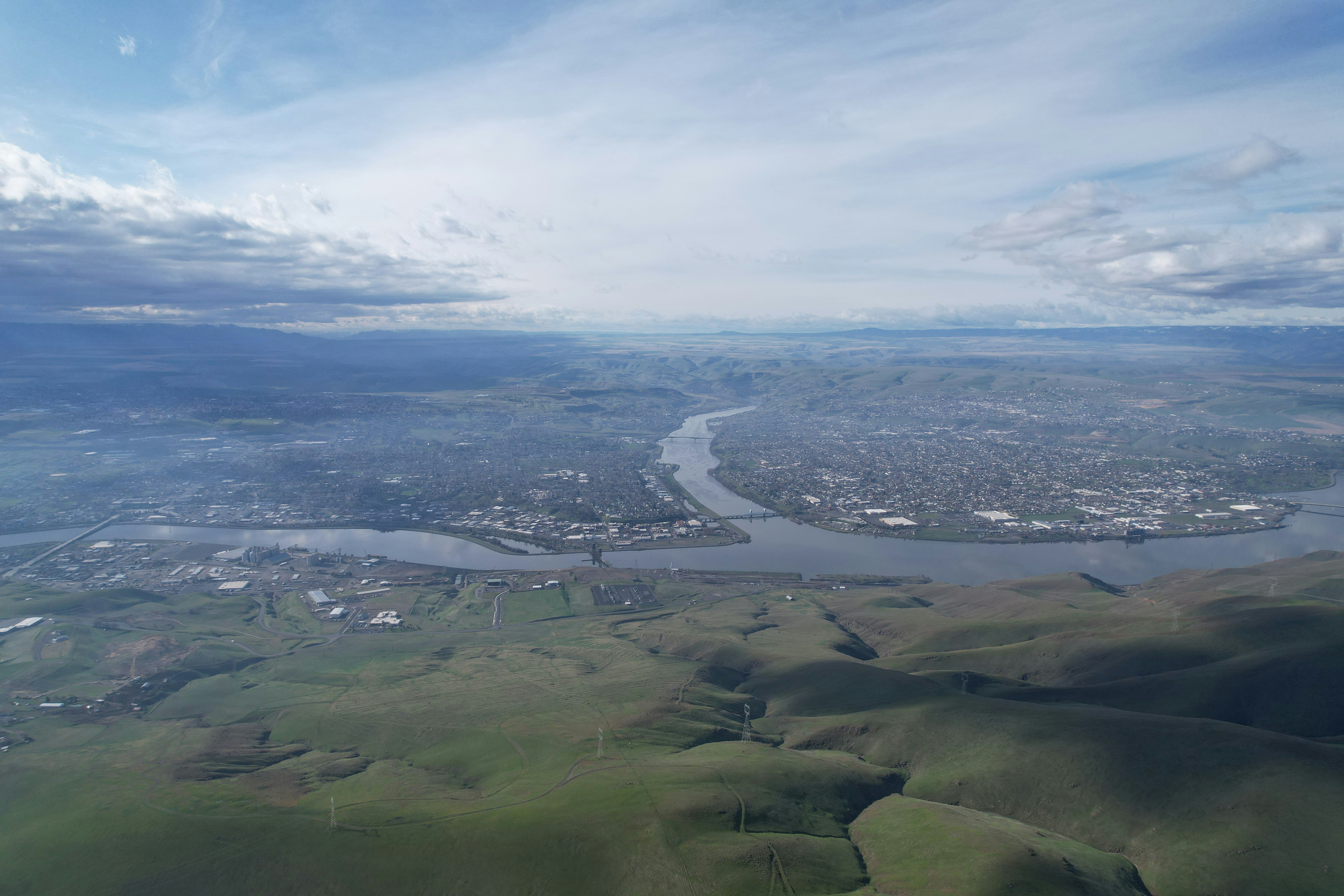 Meandering Vein Over the City: A Drone Portrait of River and Hills