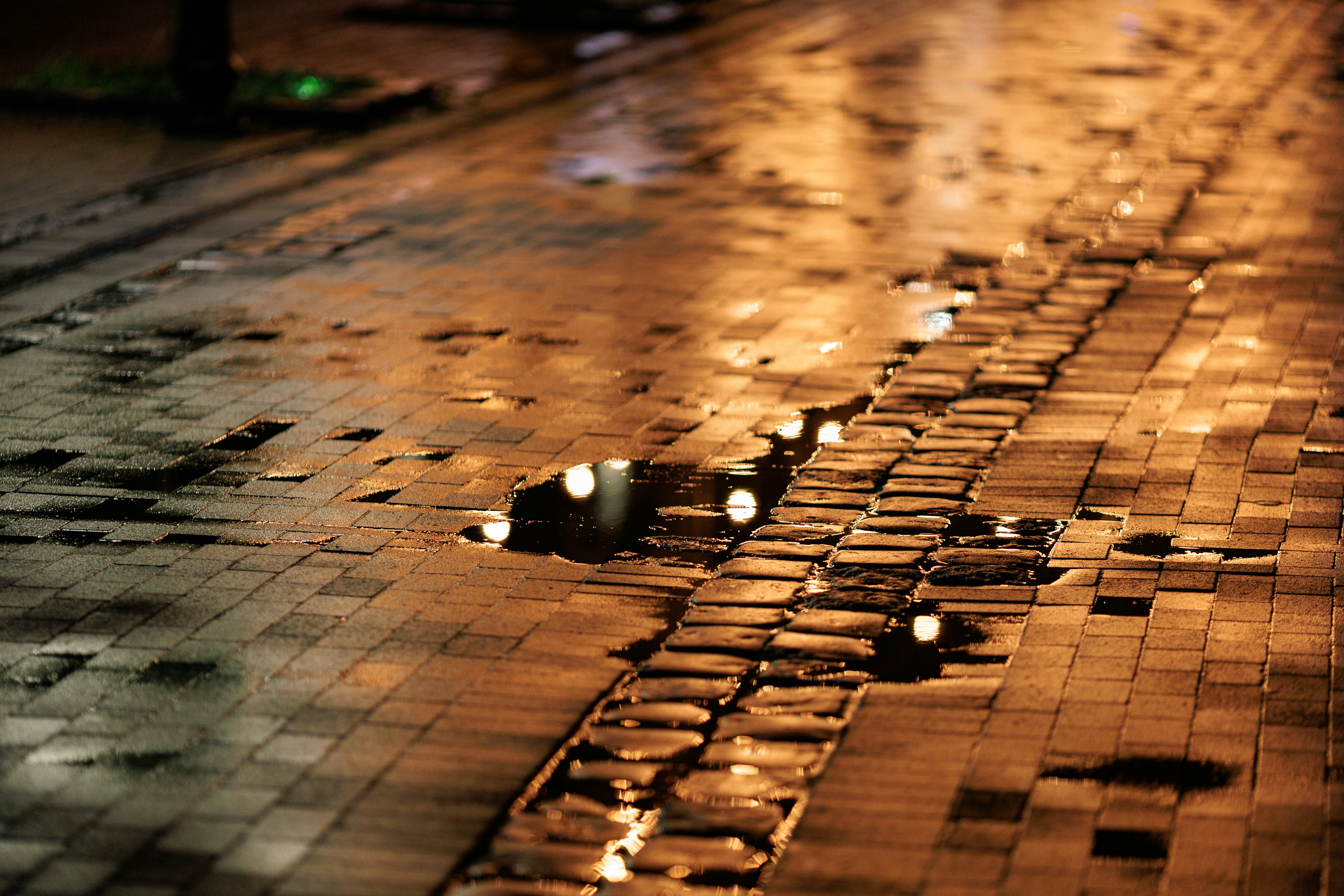 a group of light bulbs on a brick surface