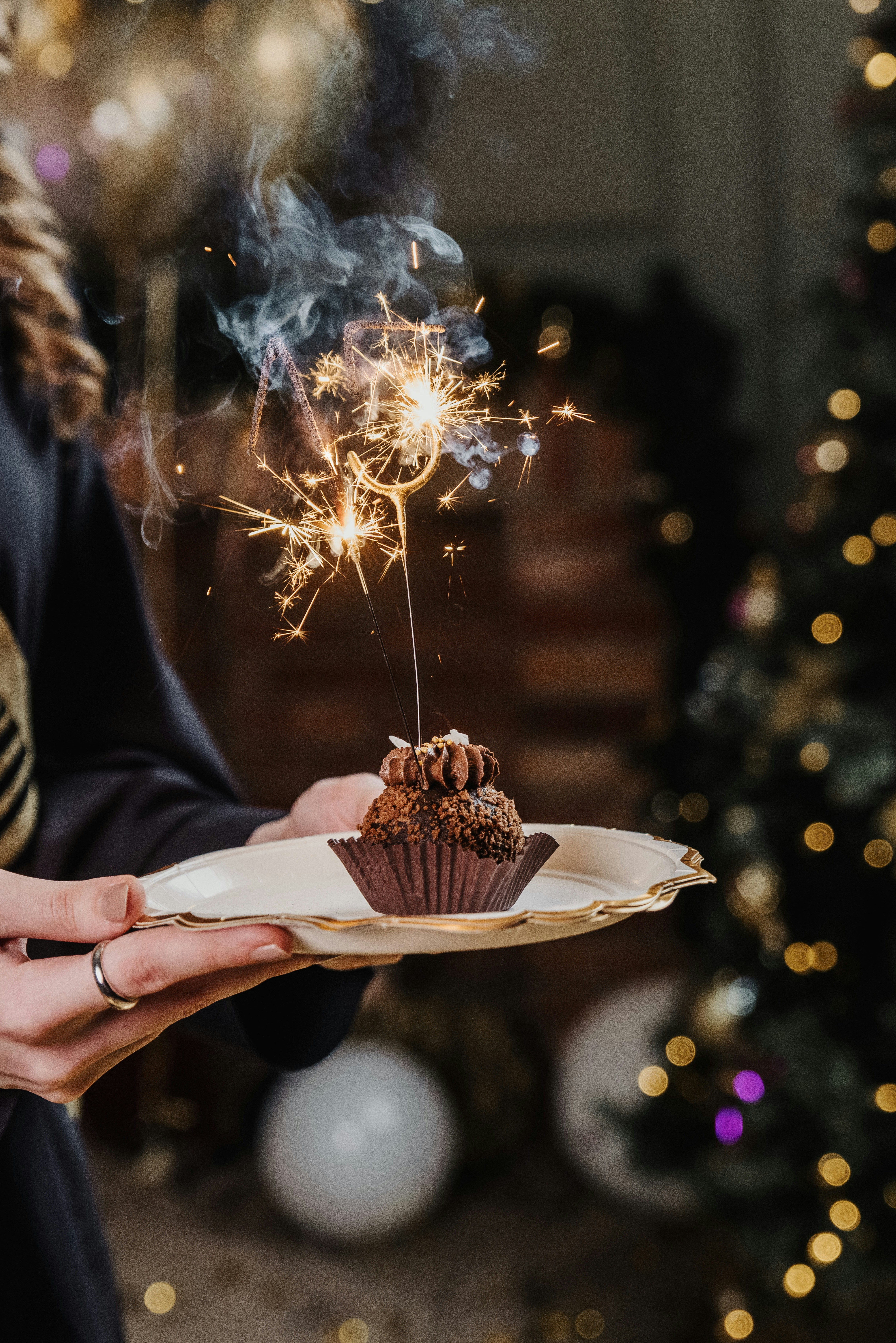 Sparkler Bloom over a Cocoa Cupcake: A Festive Moment with Bokeh