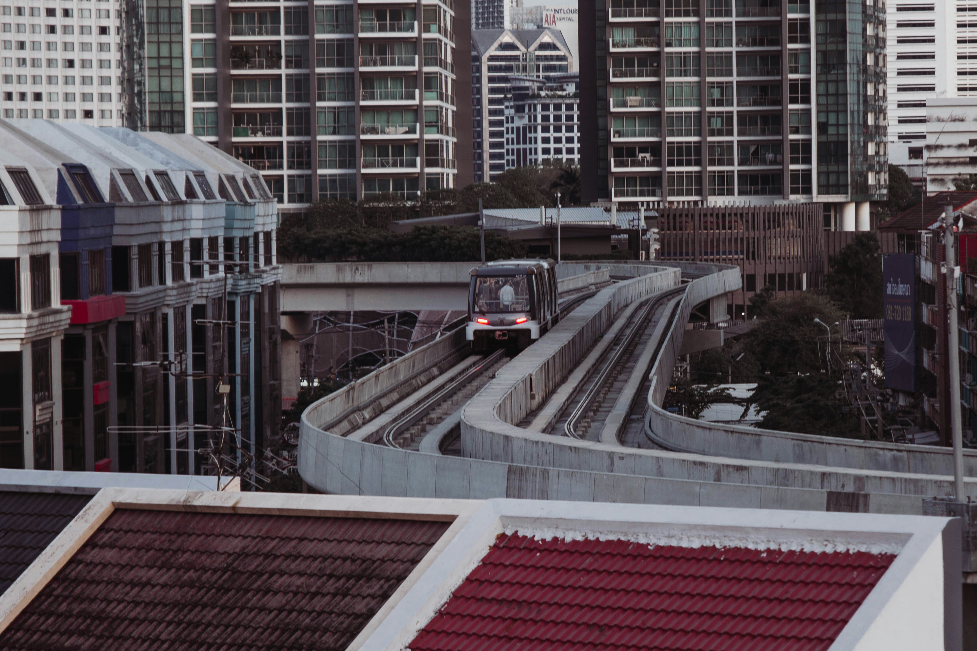 Skybound Rails: Monorail Winding Through a Glass-Canopy City