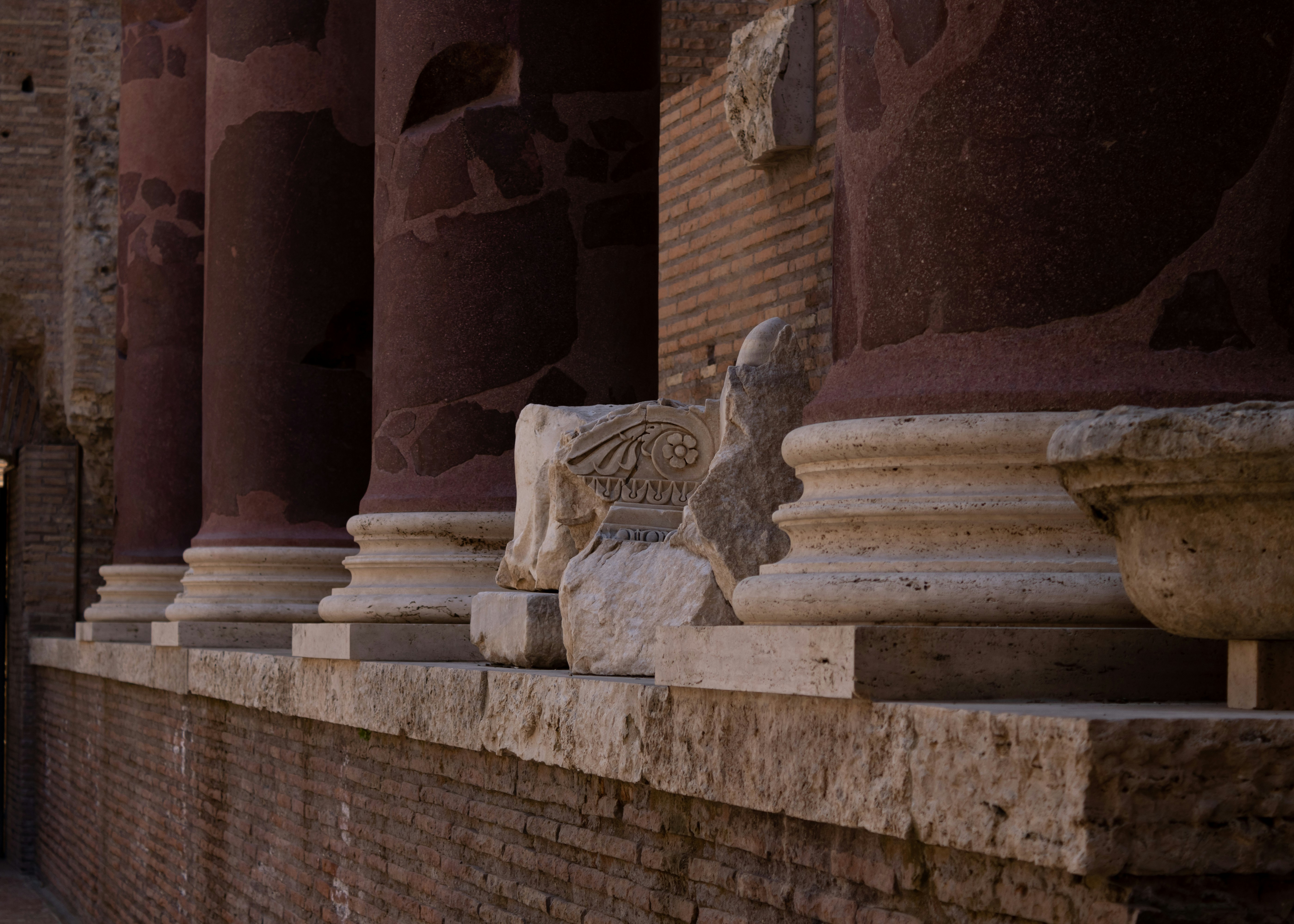 Stone Columns and Carved Lions Guarding theAncient Walkway