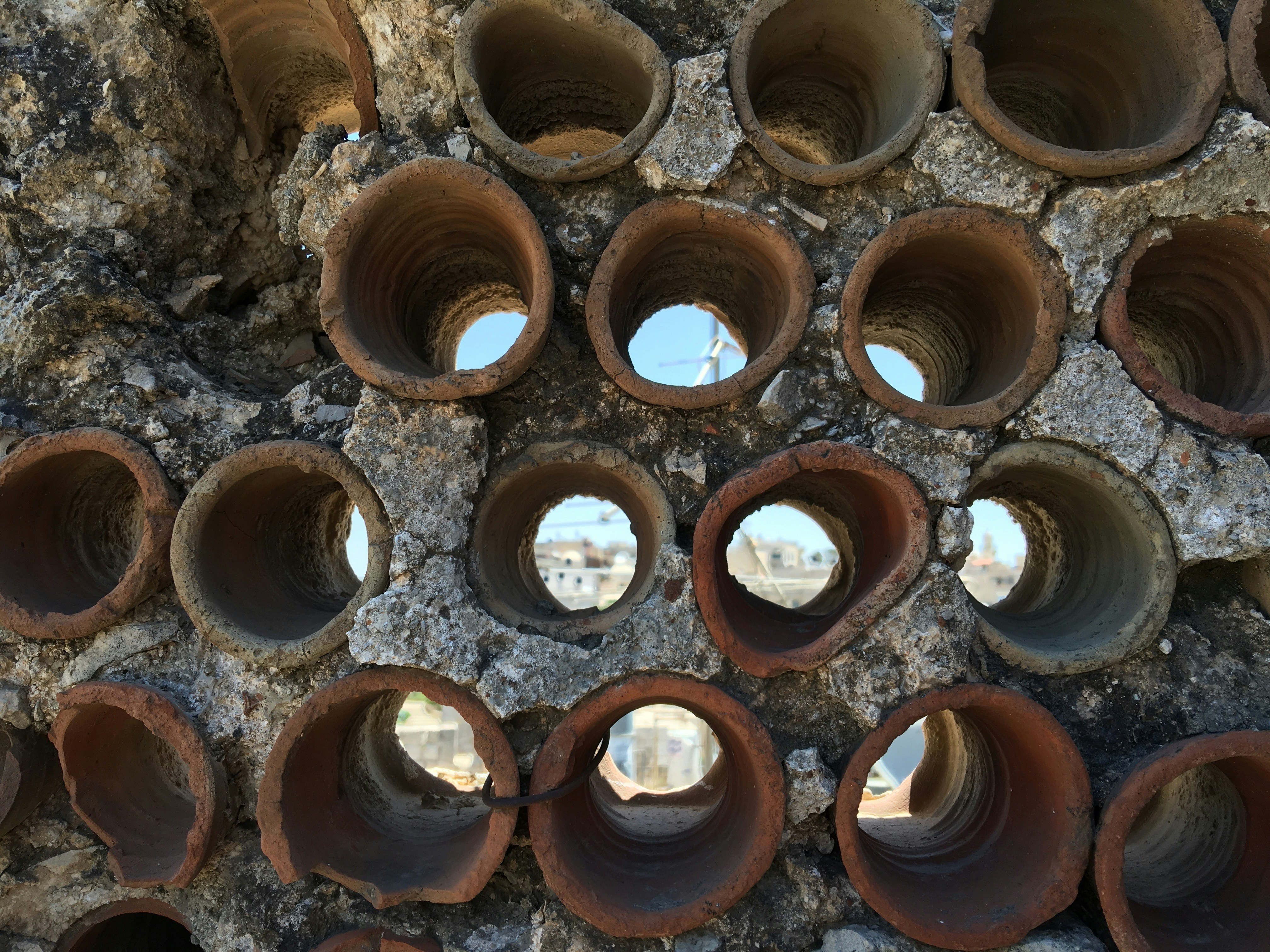 Urban Monocle: Peering Through Weathered Pipes