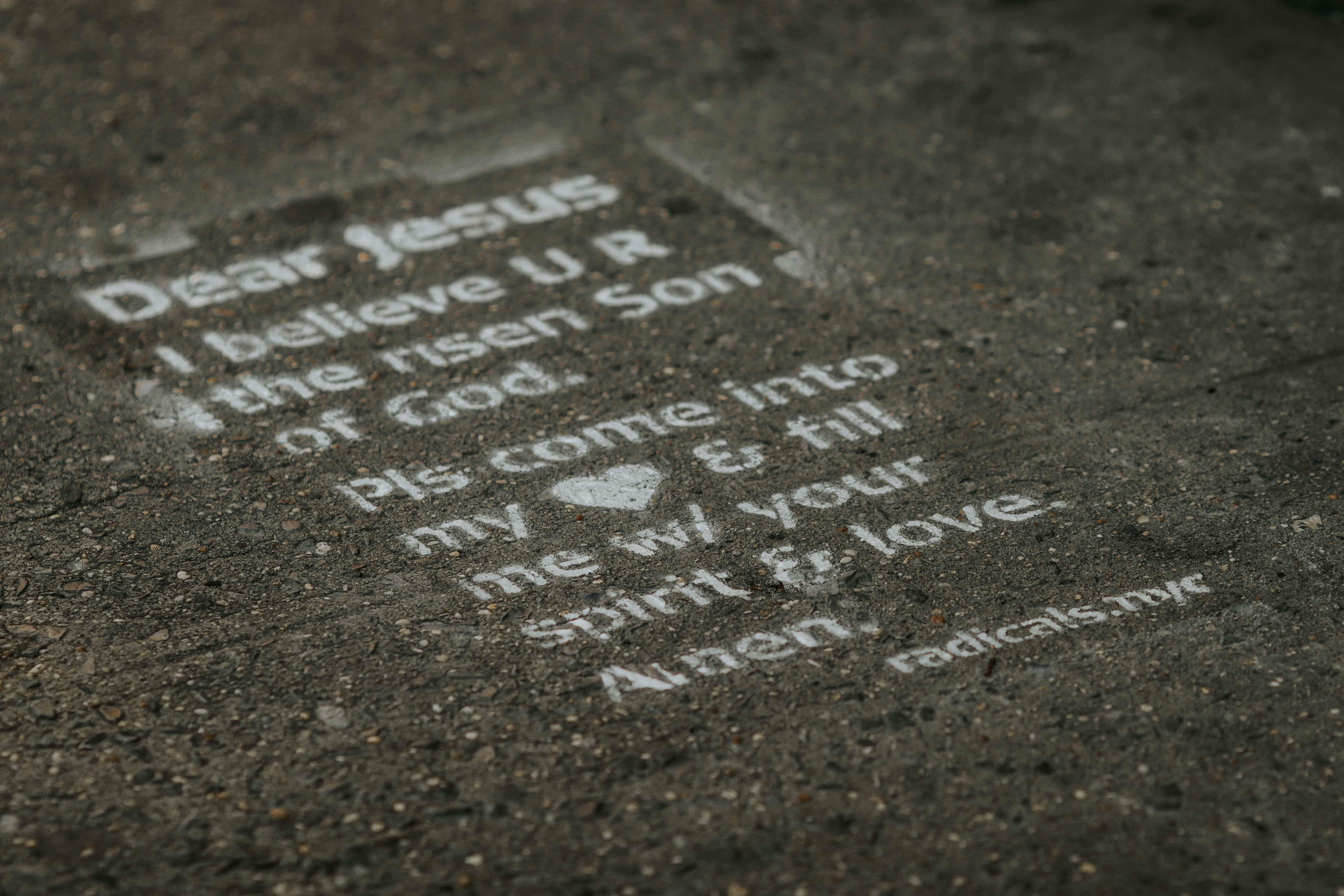 Sidewalk Prayer: A Chalked Message on Sunlit Pavement