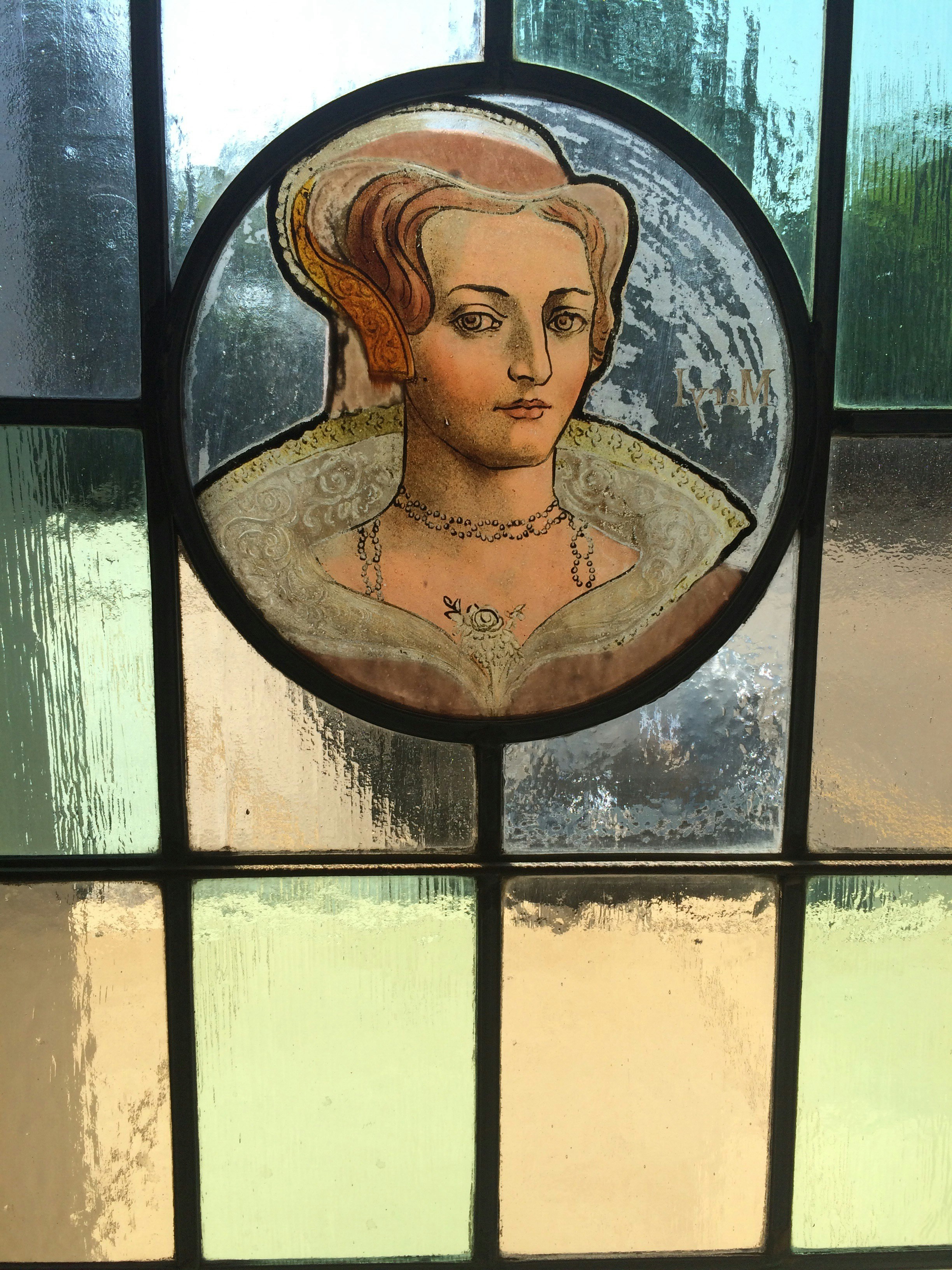 A decorative inset on a glass door.
