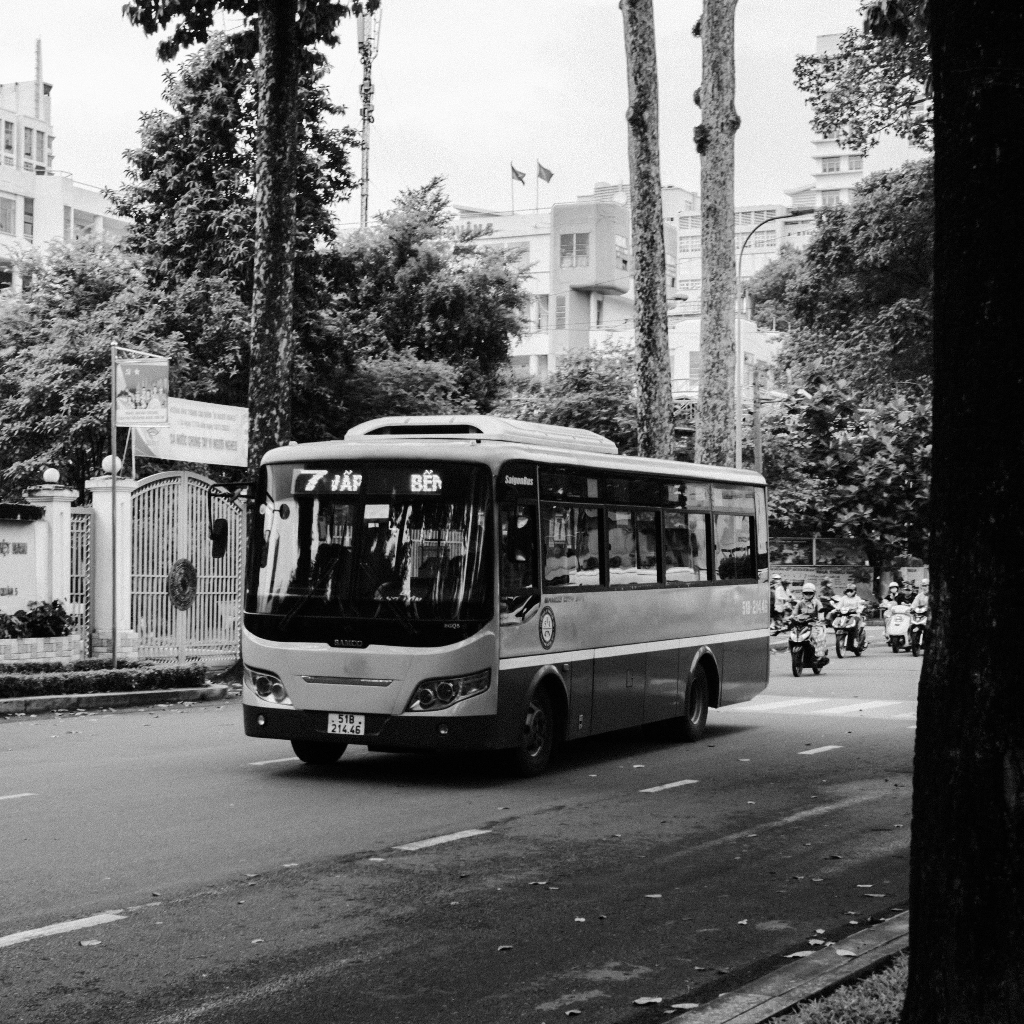 a bus travels down the street