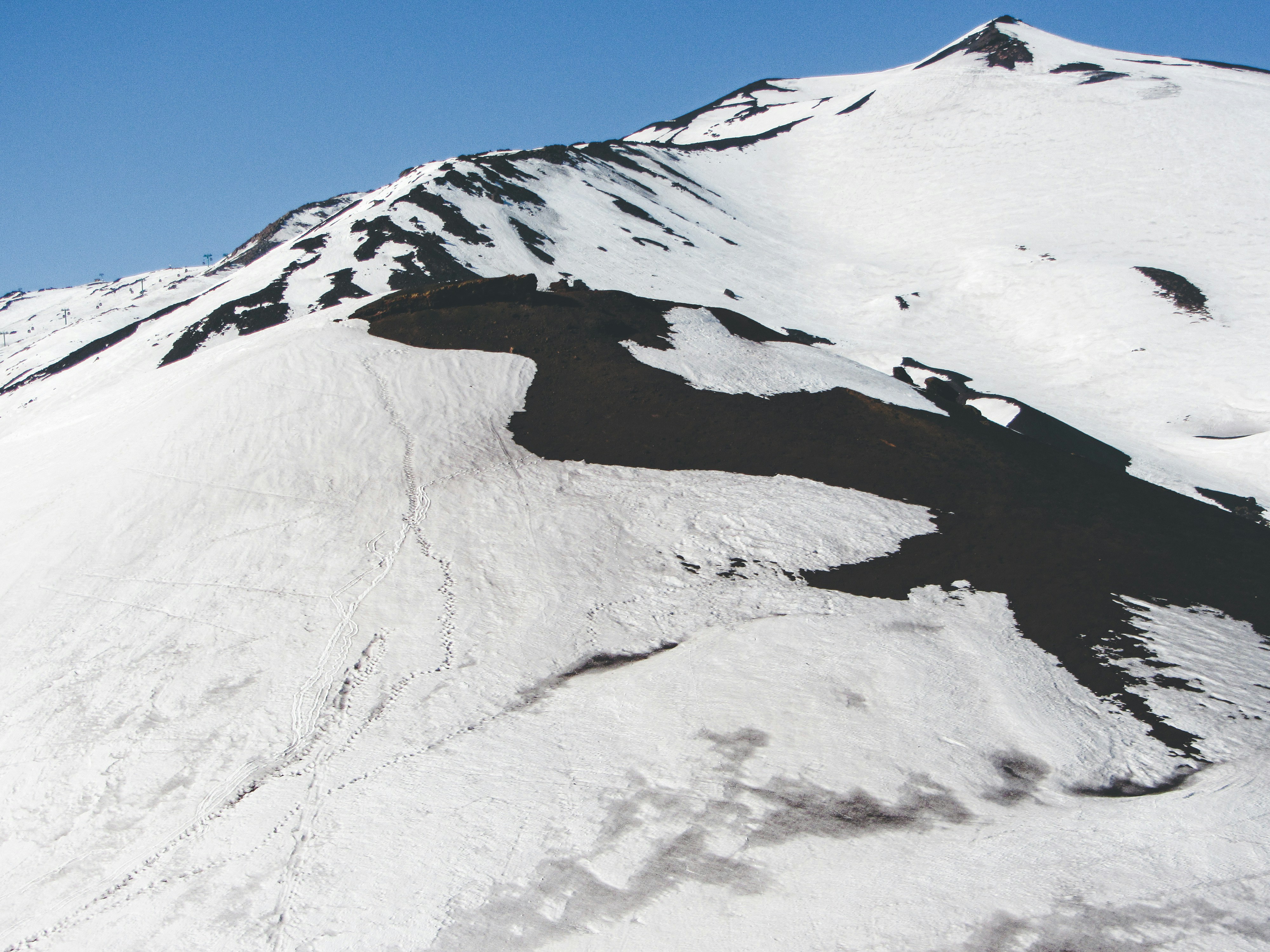 A snowy mountain with a shadow photo – Free Travel Image on Unsplash