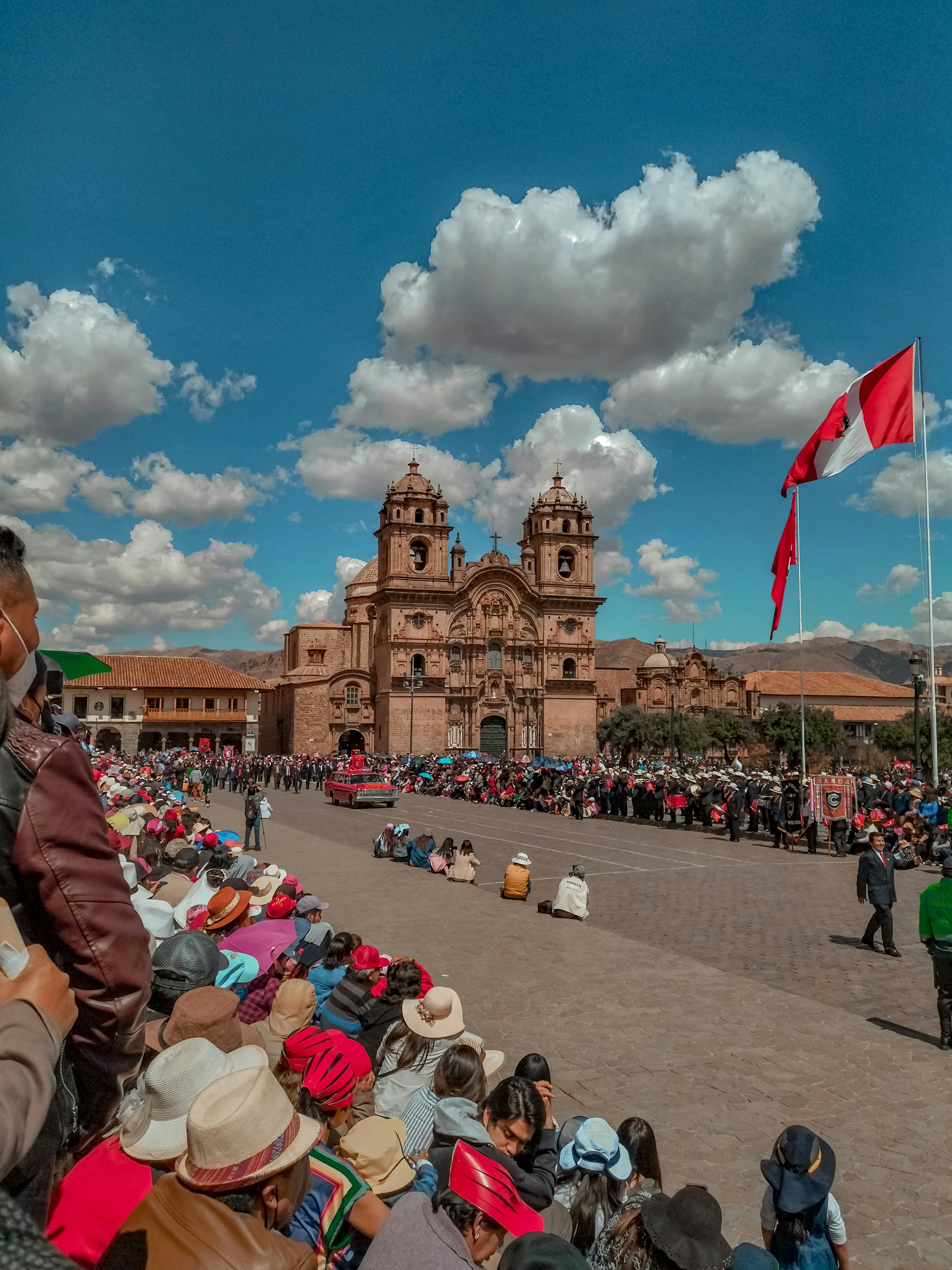 Hats in the Plaza Before Cusco's Brick Cathedral