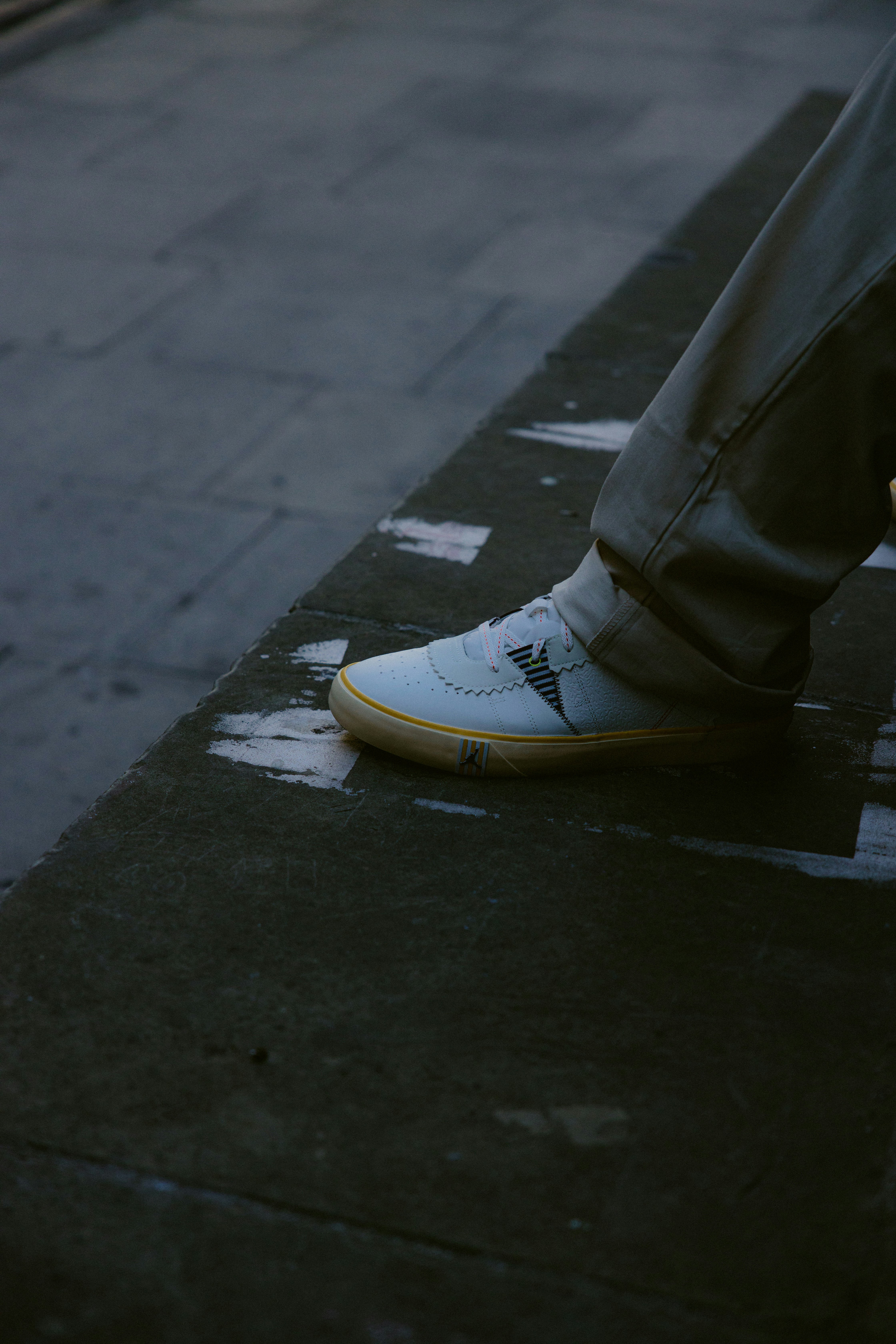 a person's leg and shoes