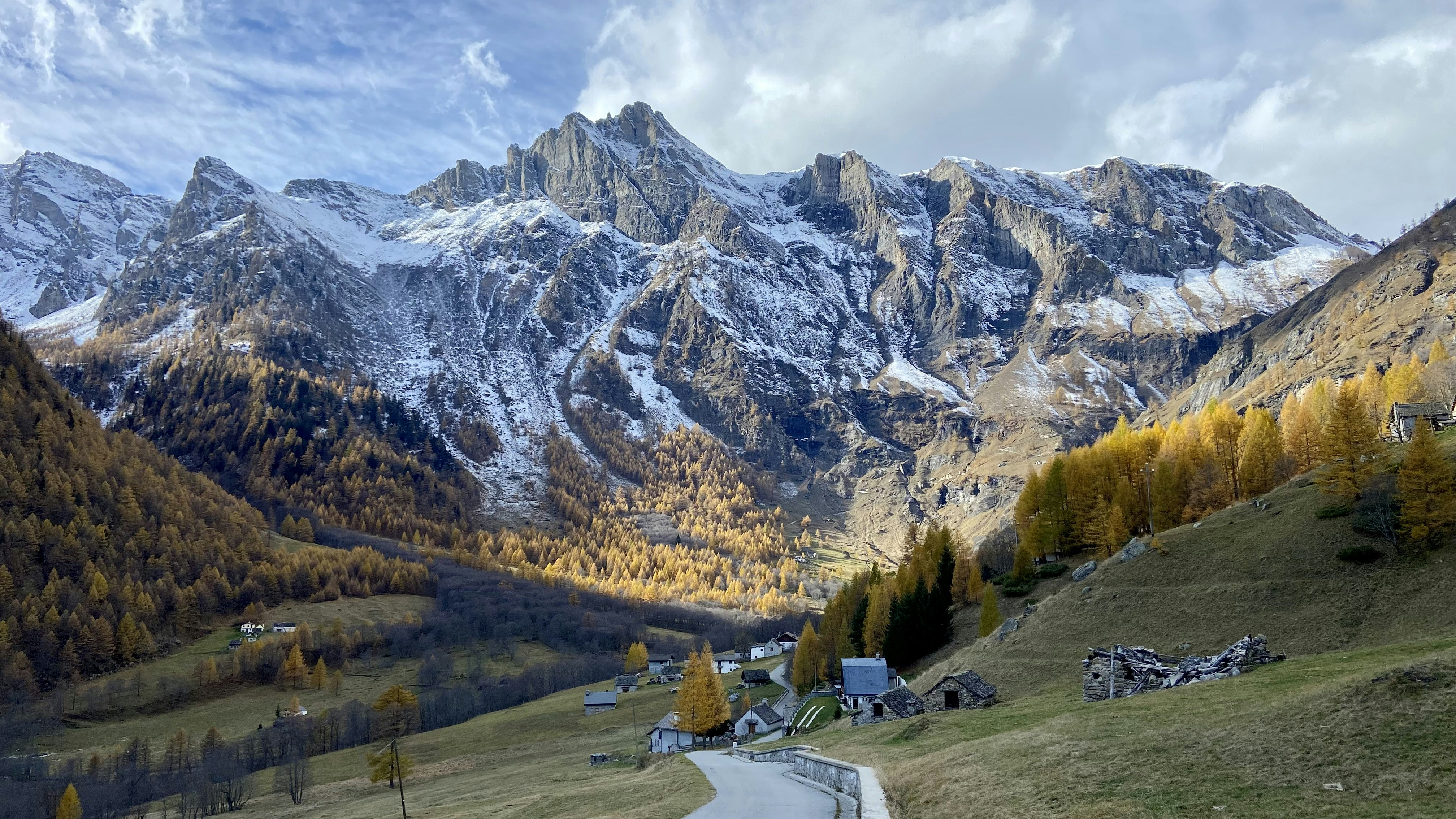 Golden Valley Under Snow-Capped Giants
