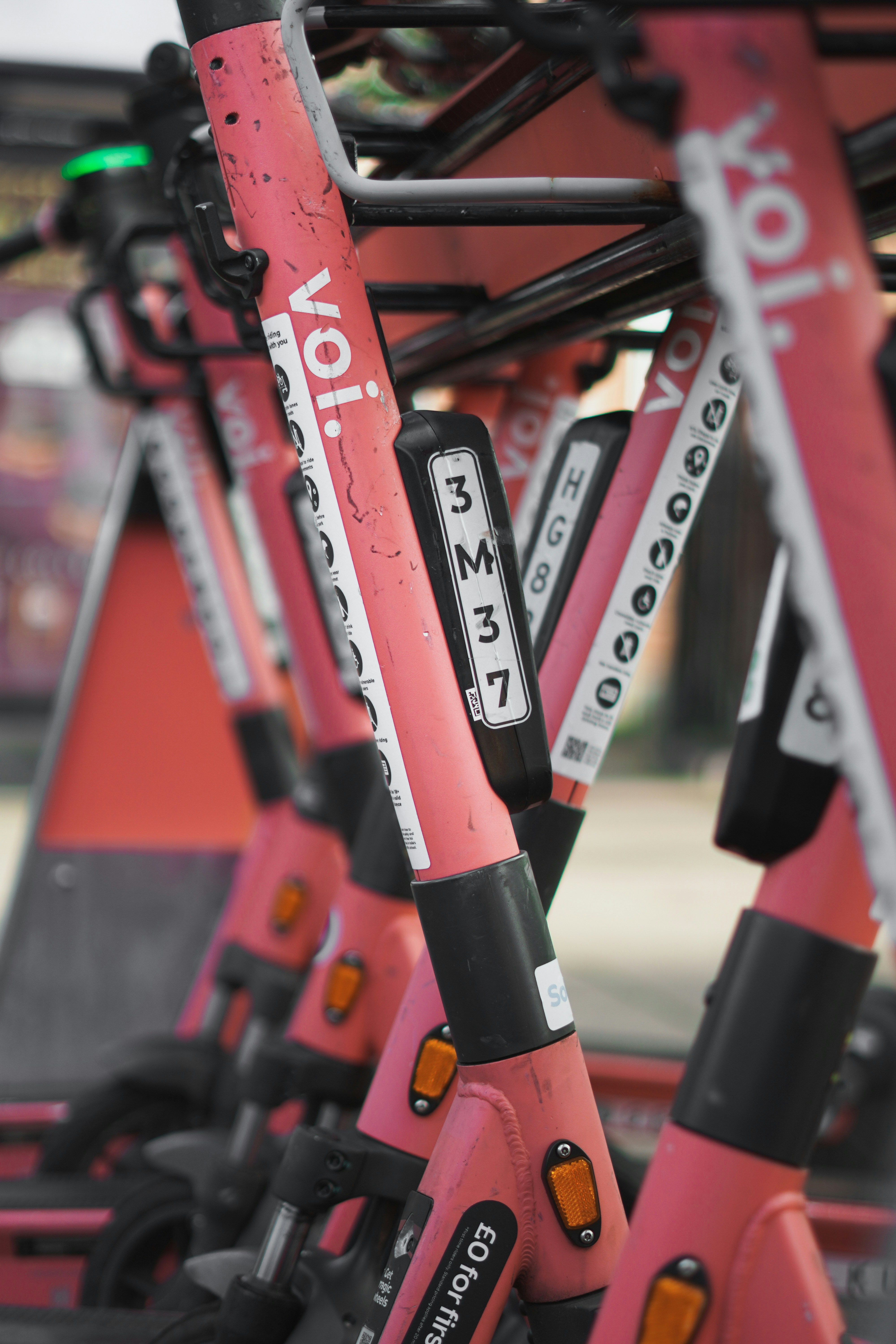 Crimson Dock: Close-Up on a Row of Voi Shared Bicycles