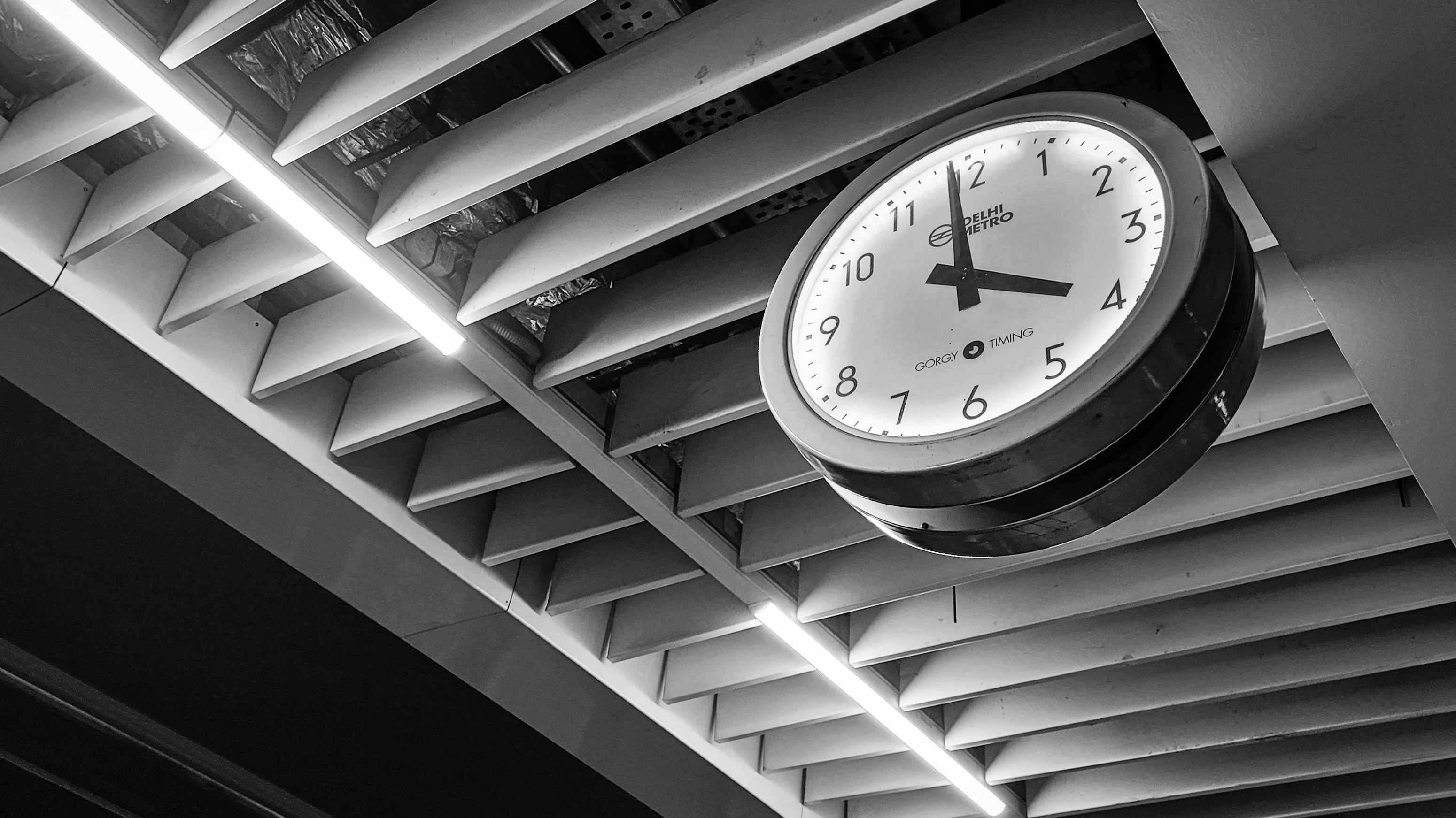 A clock on a shelf photo – Free Image on Unsplash