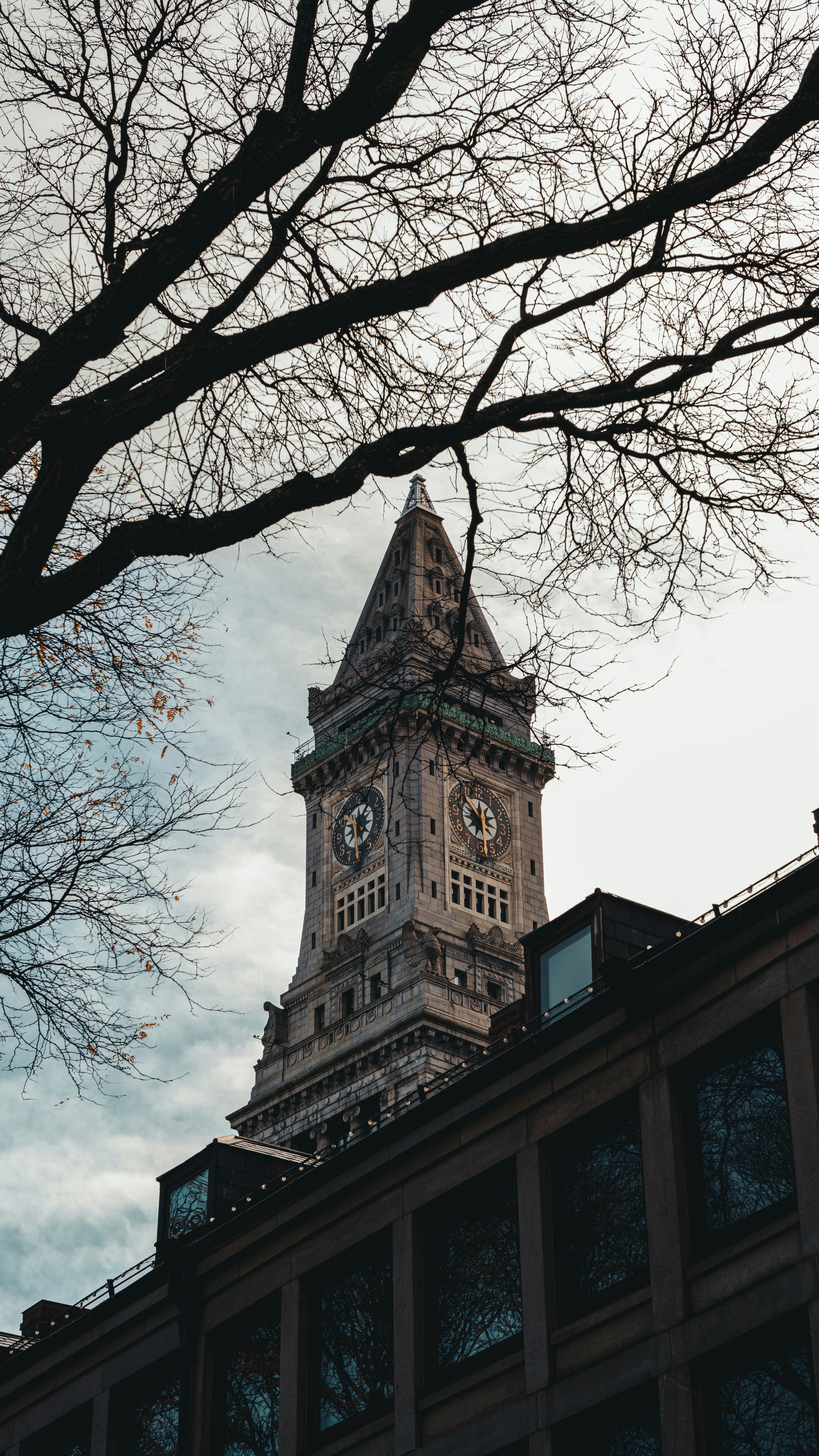 A clock tower on a building photo – Free Boston Image on Unsplash