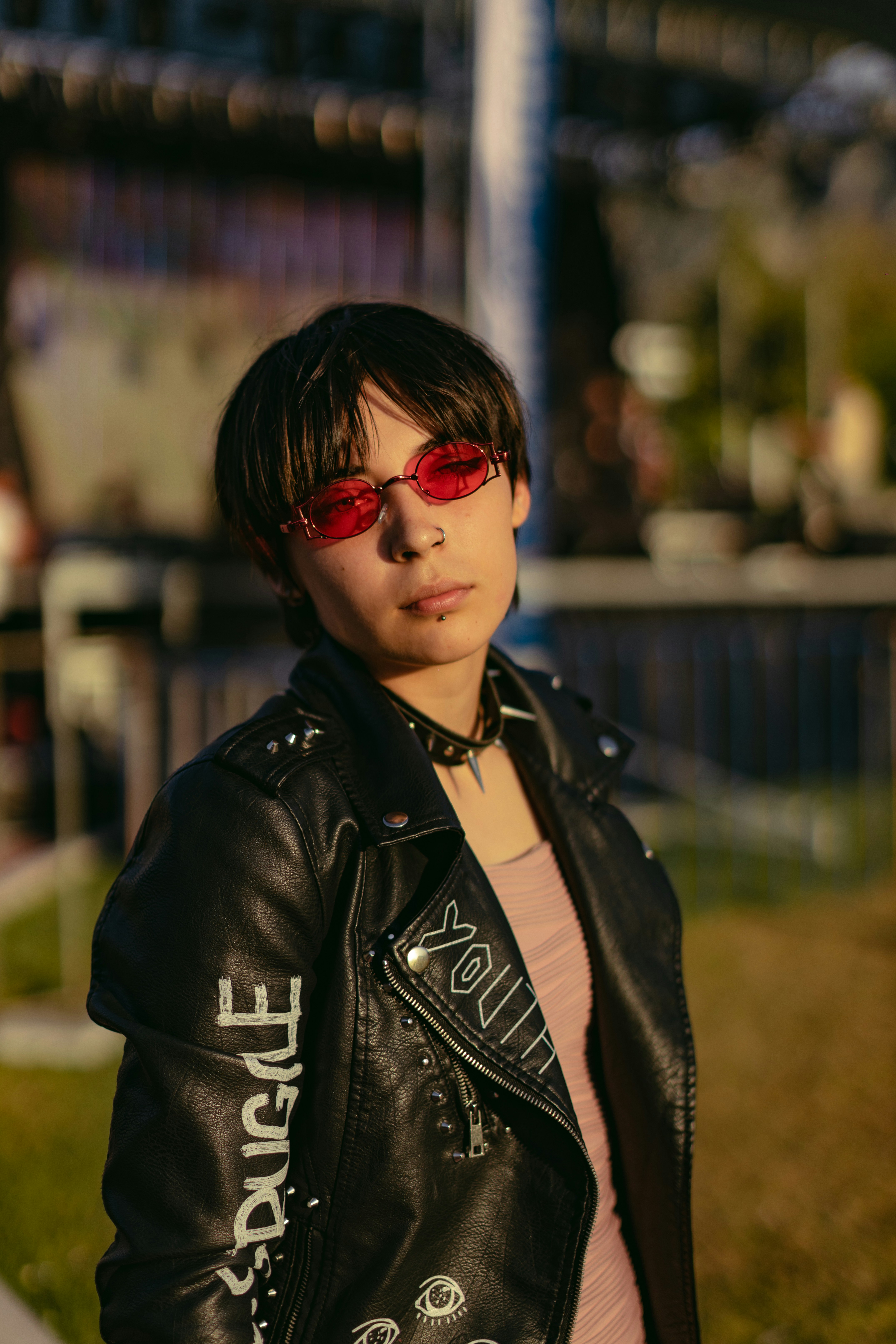 Red-Tinted Gaze: A Rebel in Soft Sunset Light