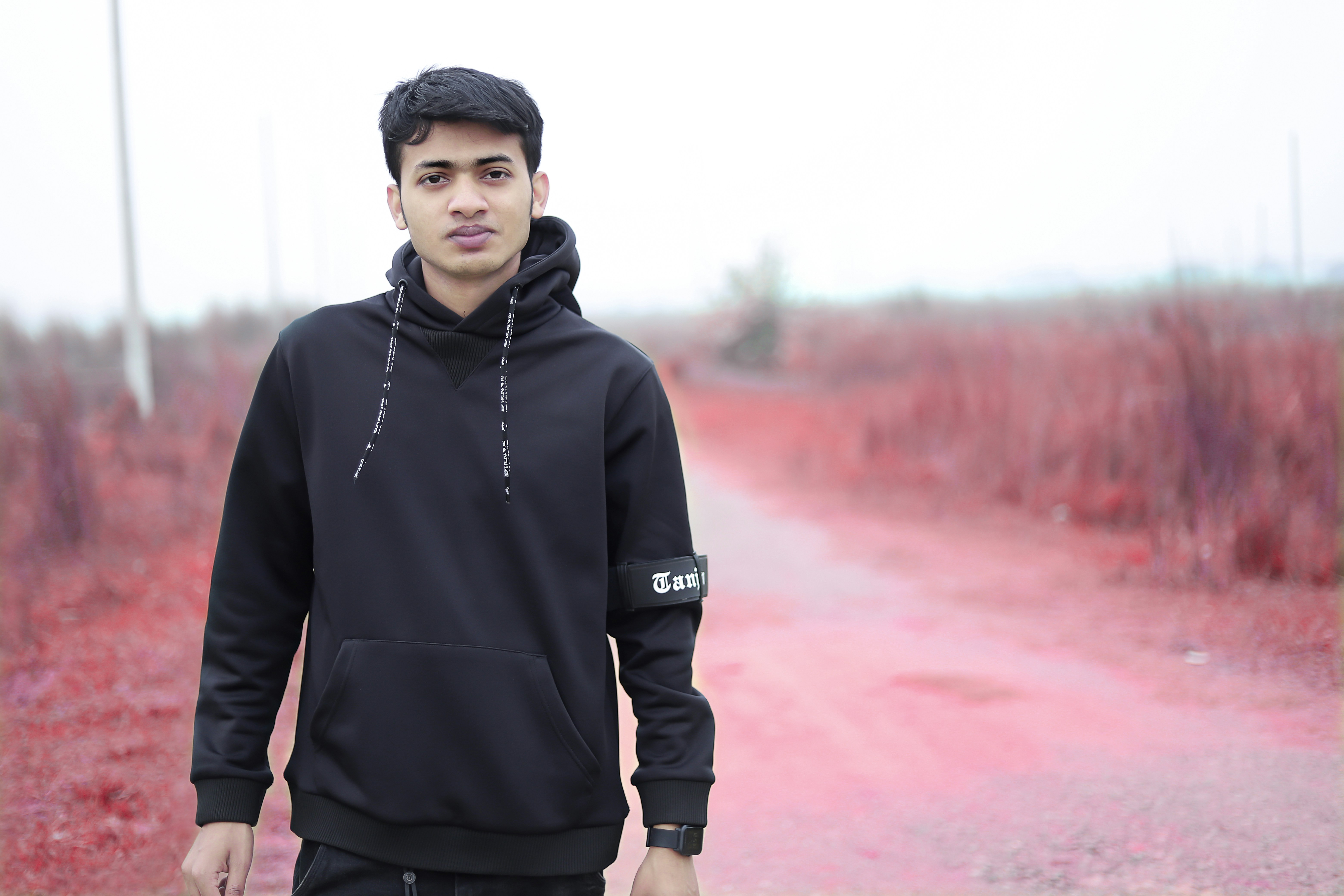 Crimson Road Portrait: Quiet Confidence on a Scarlet Path