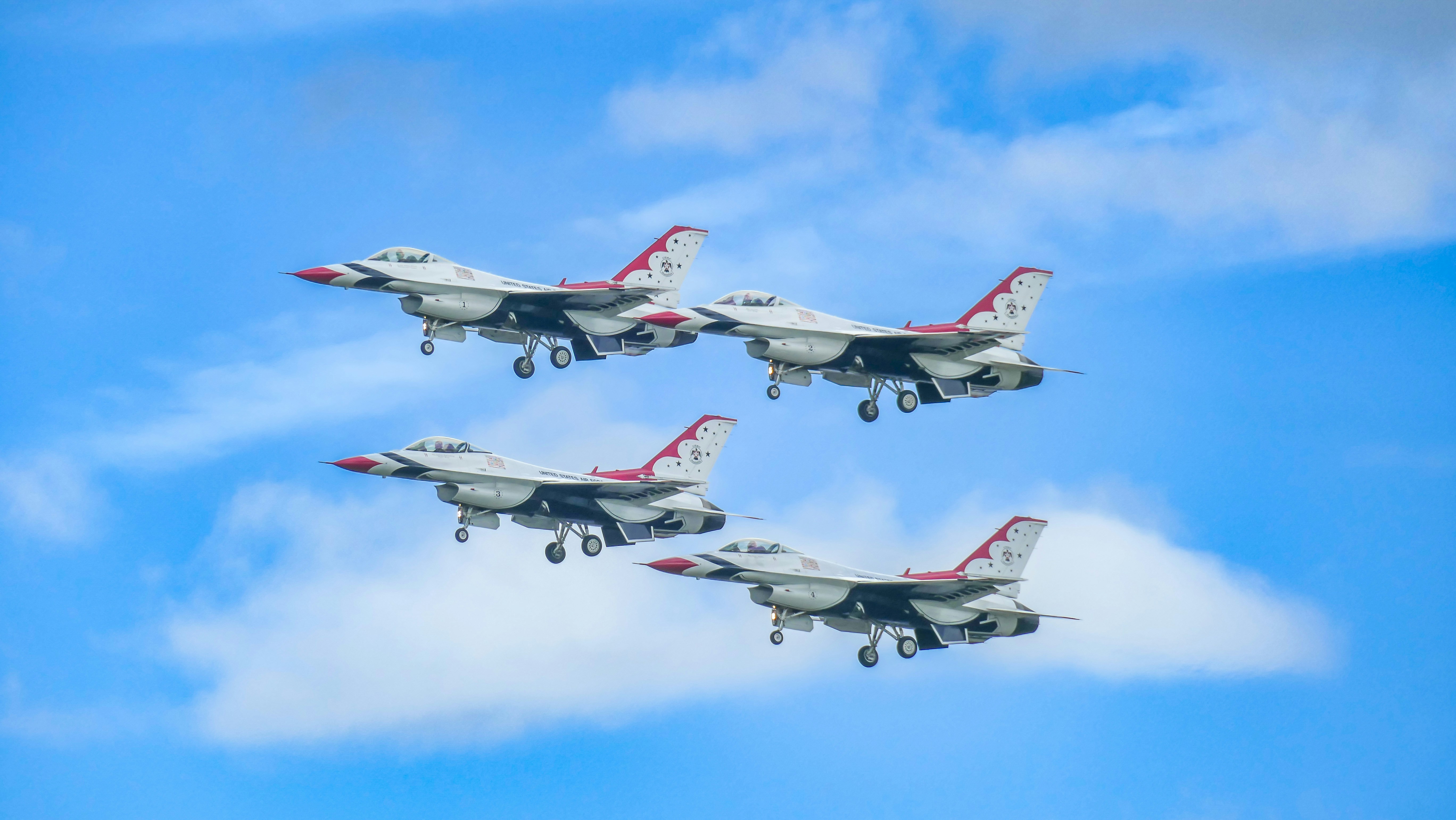 A group of airplanes flying in the sky photo – Free Sanford airport ...