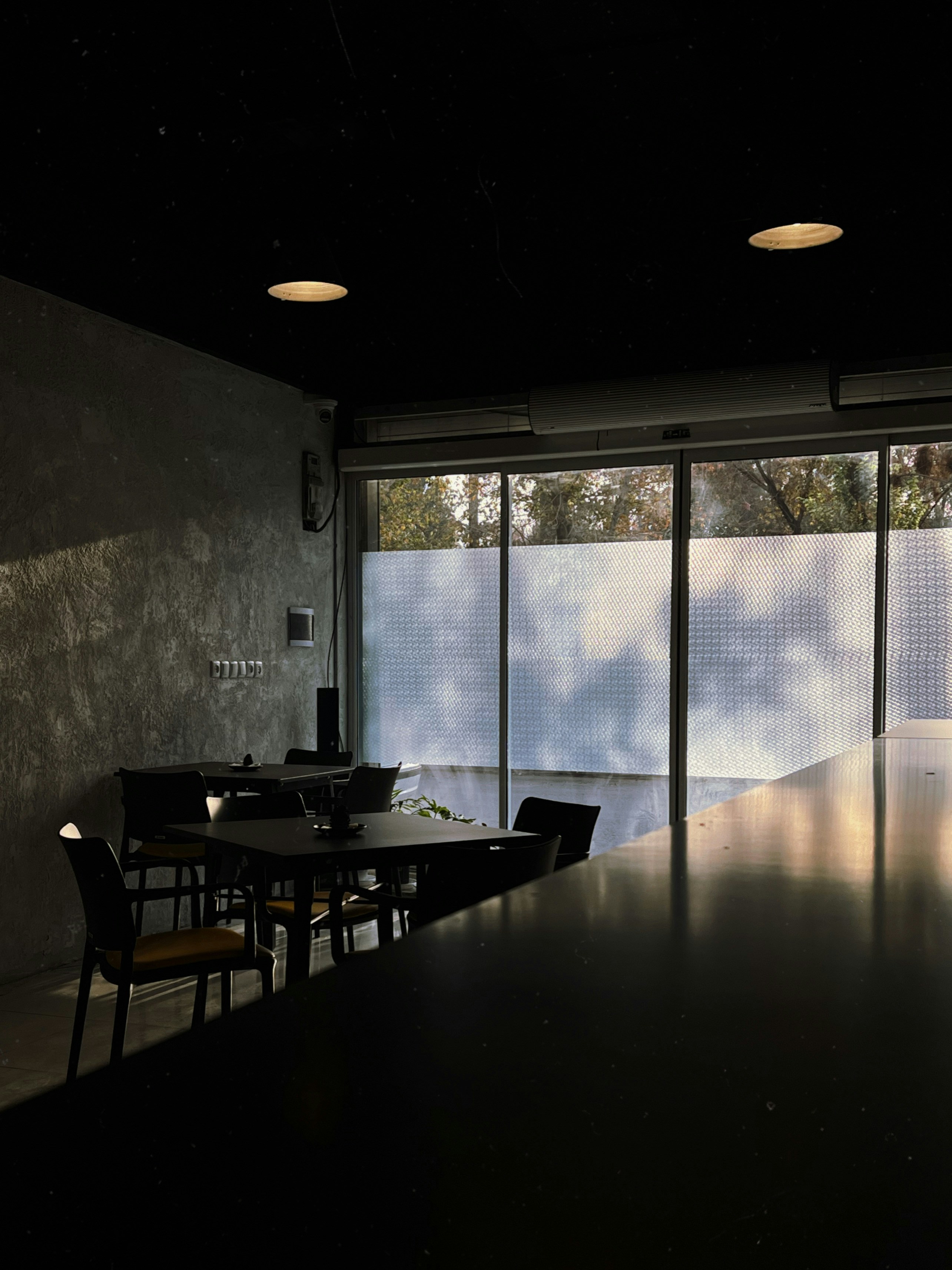 a room with a table and chairs