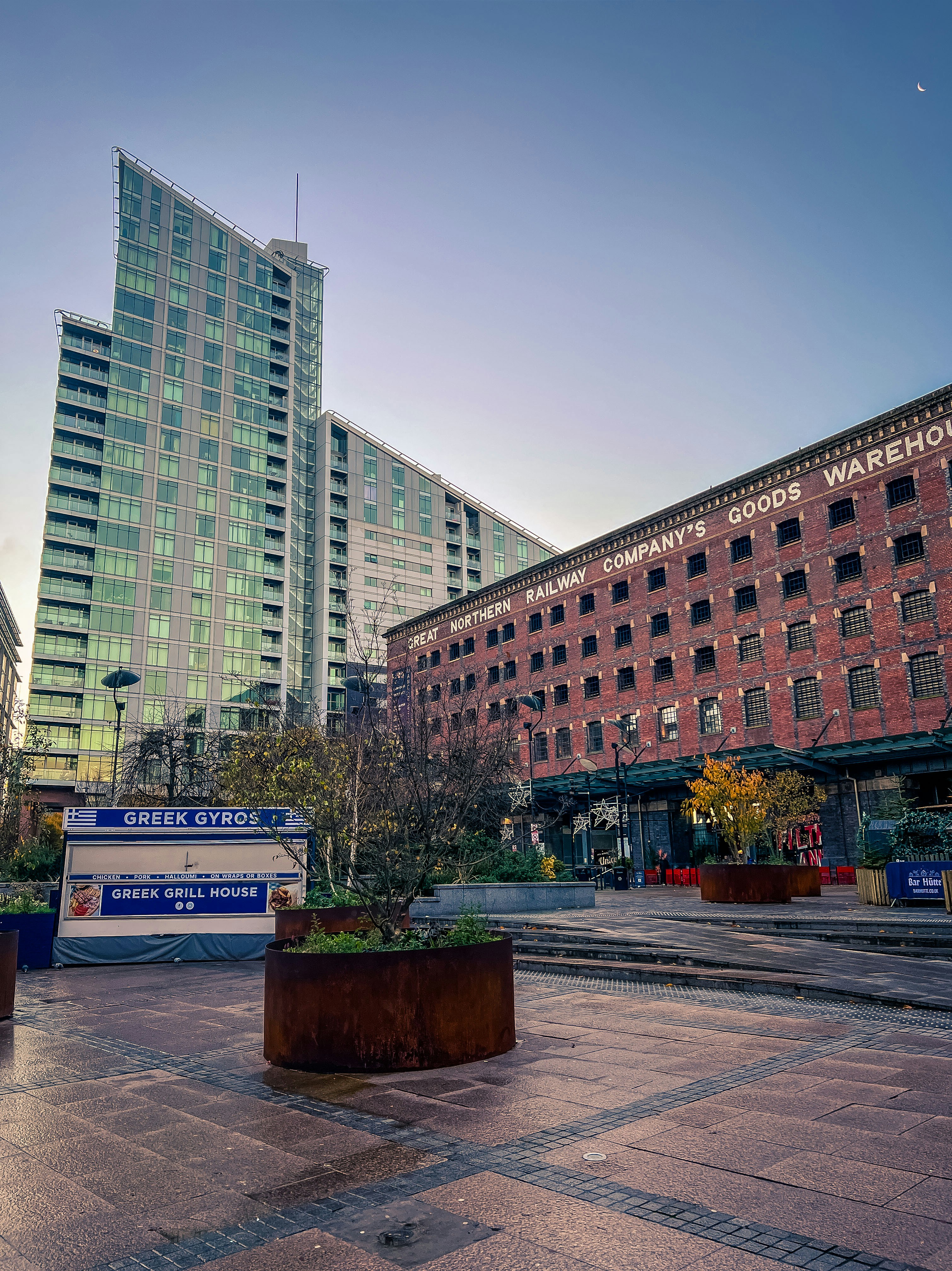 Urban Fusion: Modern Heights and Vintage Brickwork