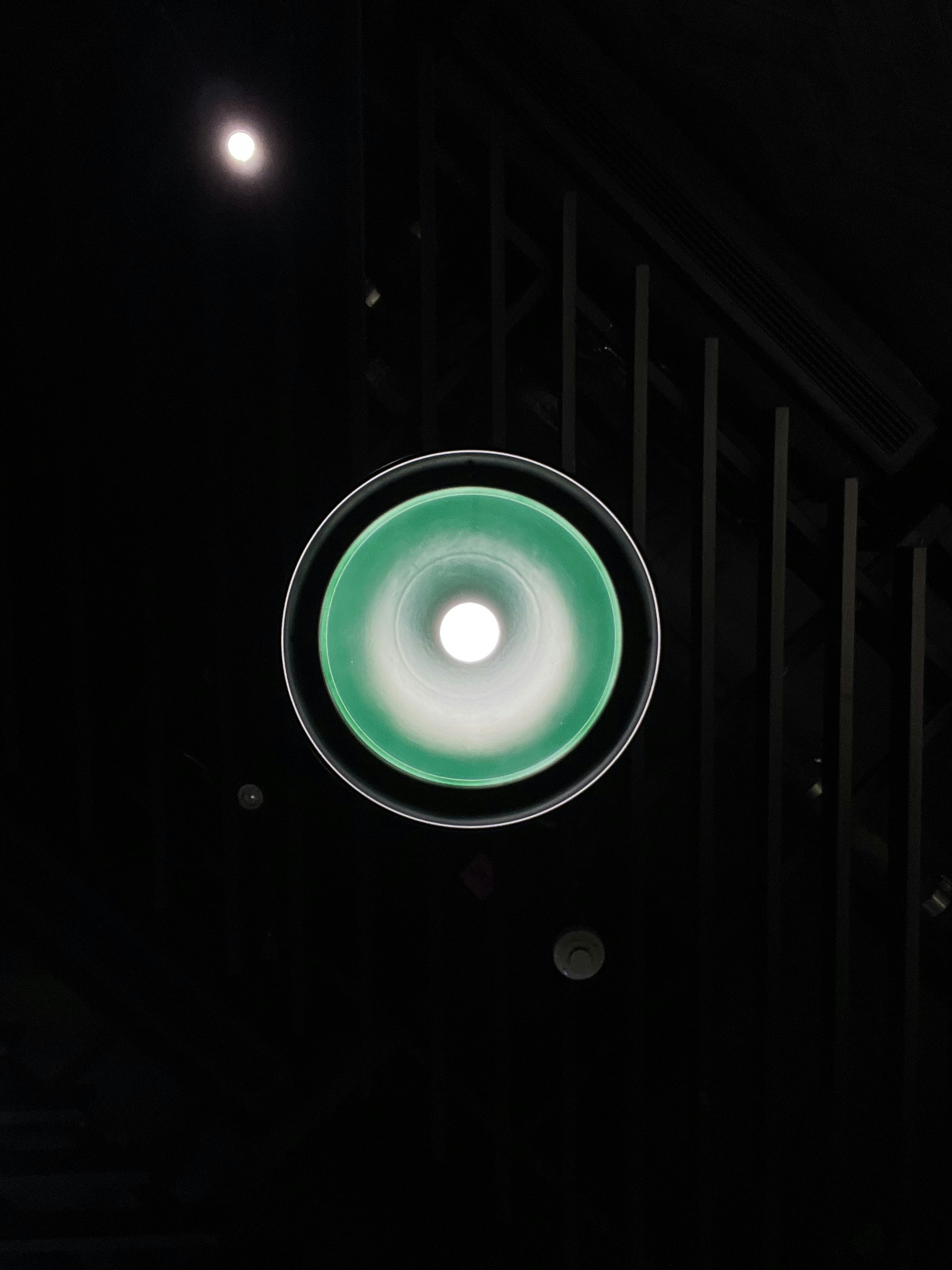 Midnight Halo: A Green-Rimmed Circle Illuminating the Dark