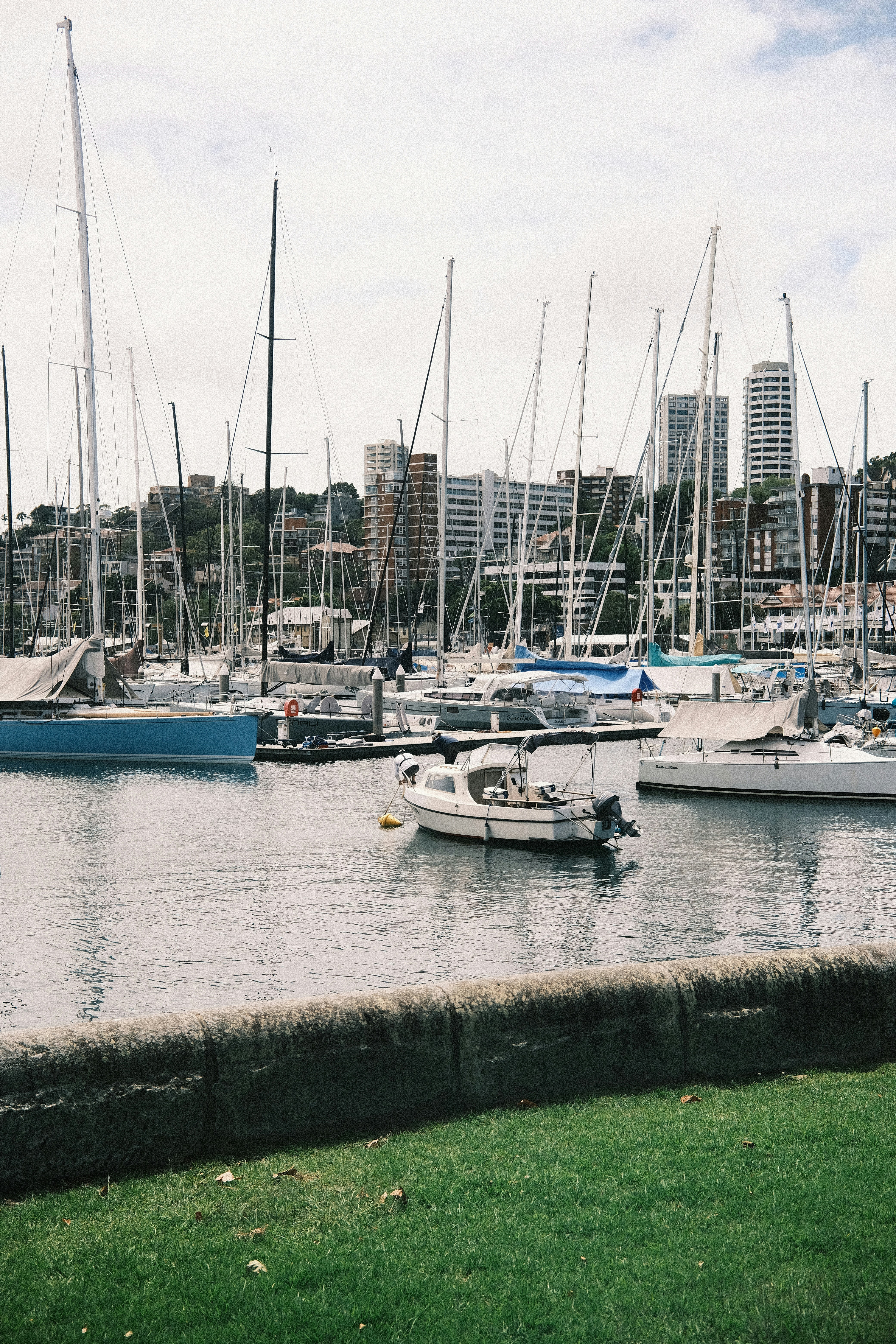 A group of boats in a harbor photo – Free Boat Image on Unsplash
