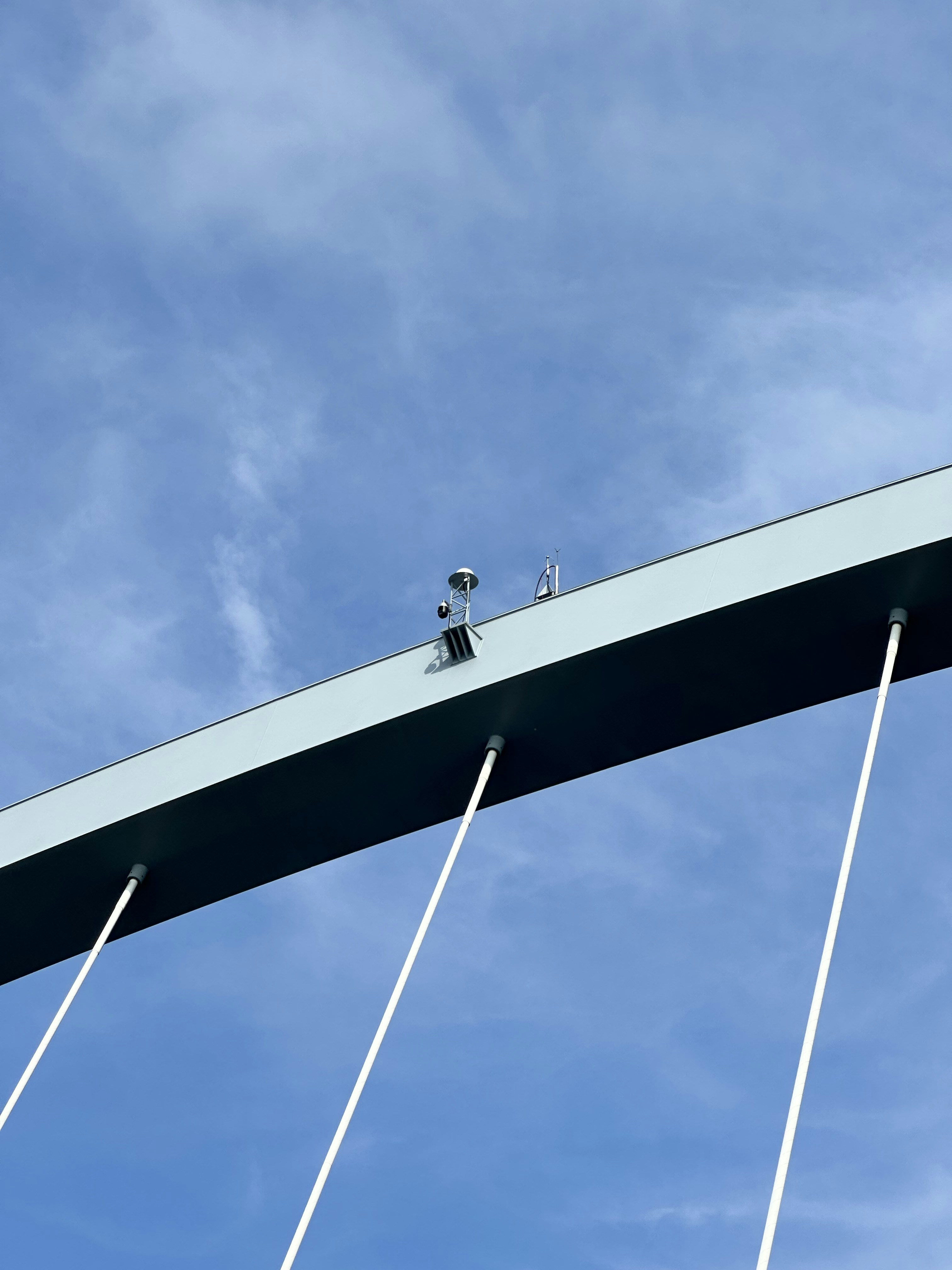 a person standing on a metal structure