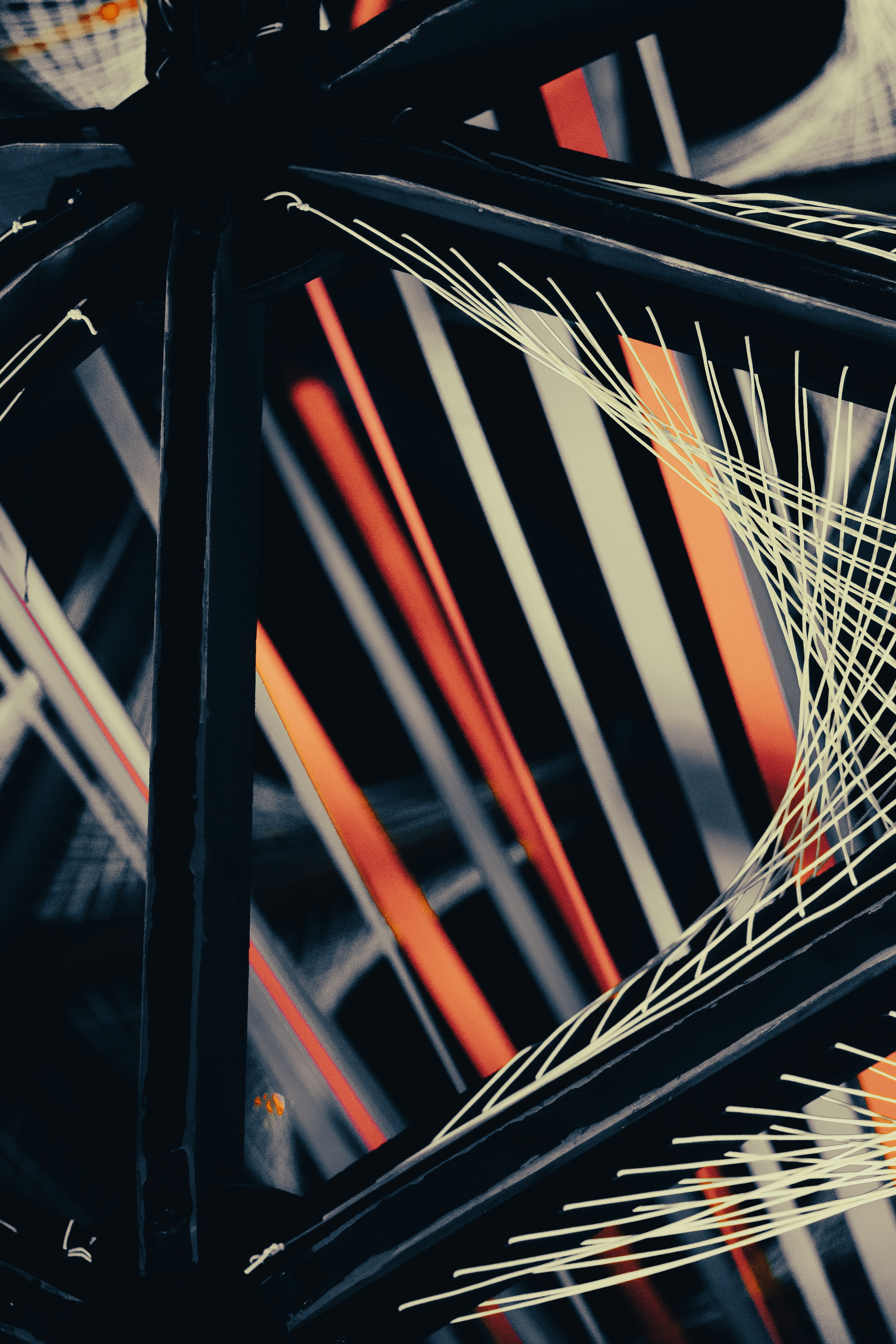 Interwoven Geometry: A Close-Up of Structural Threads and Color Lines
