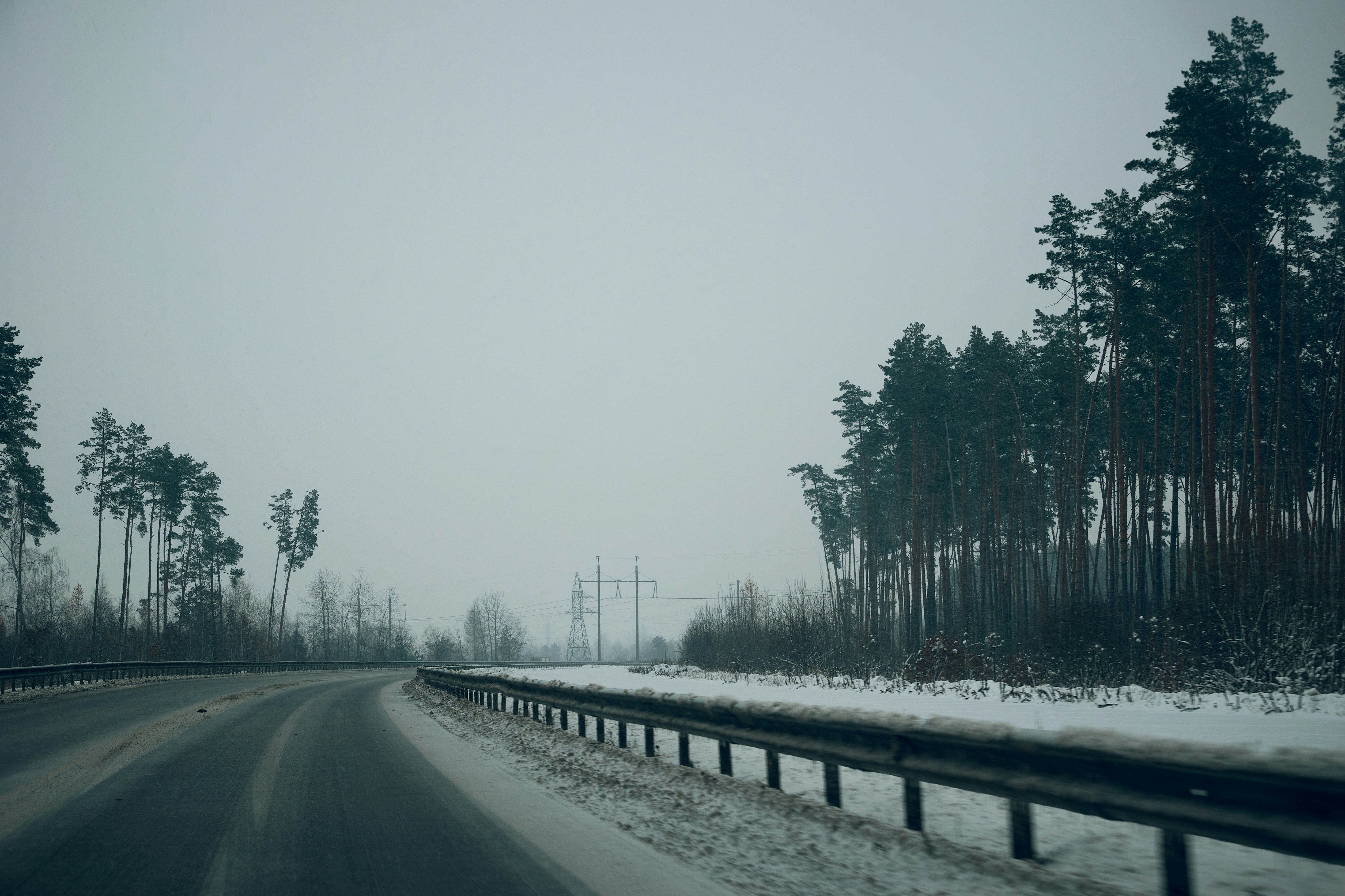 a road with snow on the side