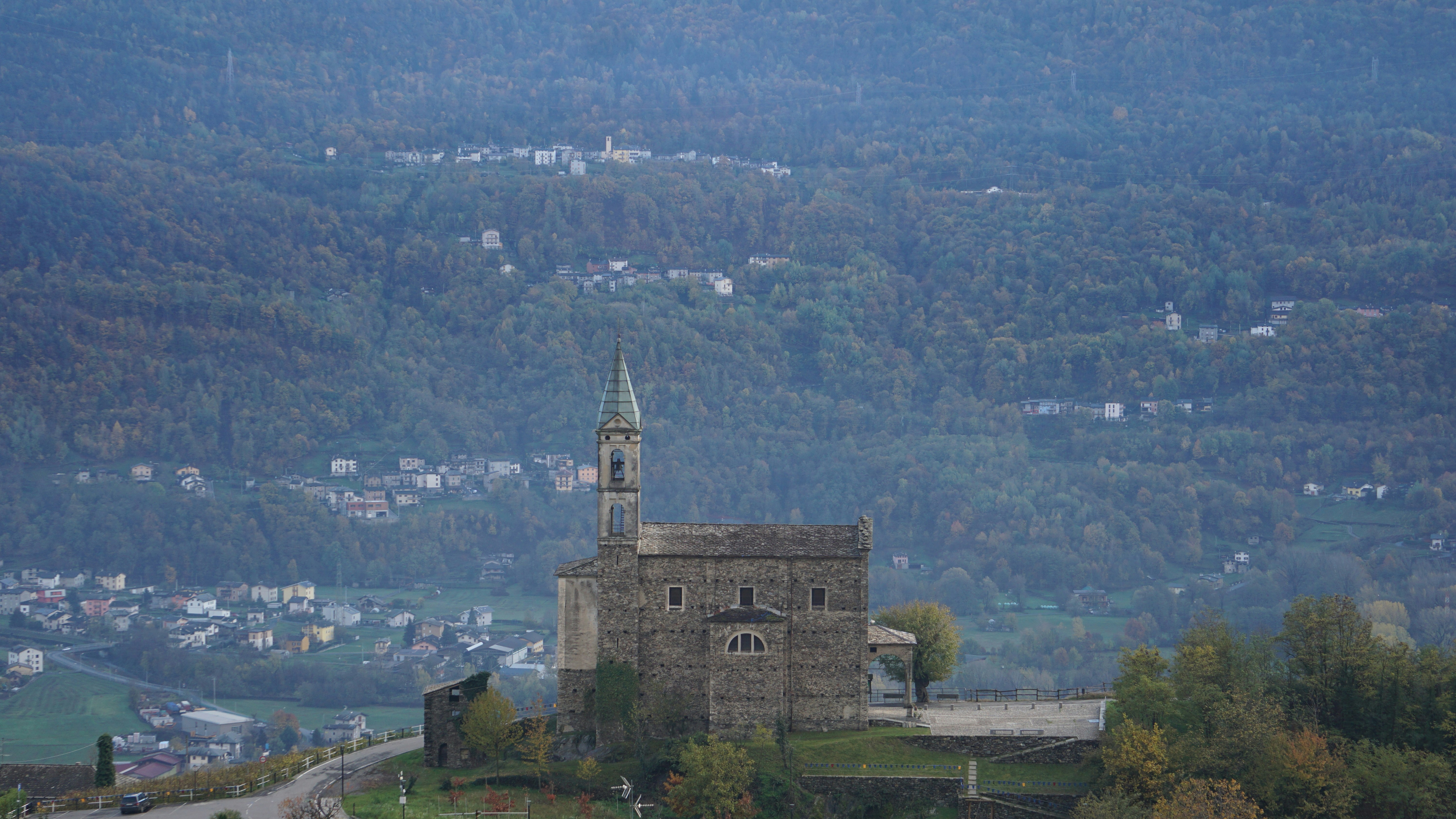 Hilltop Fortress in Misty Valleys