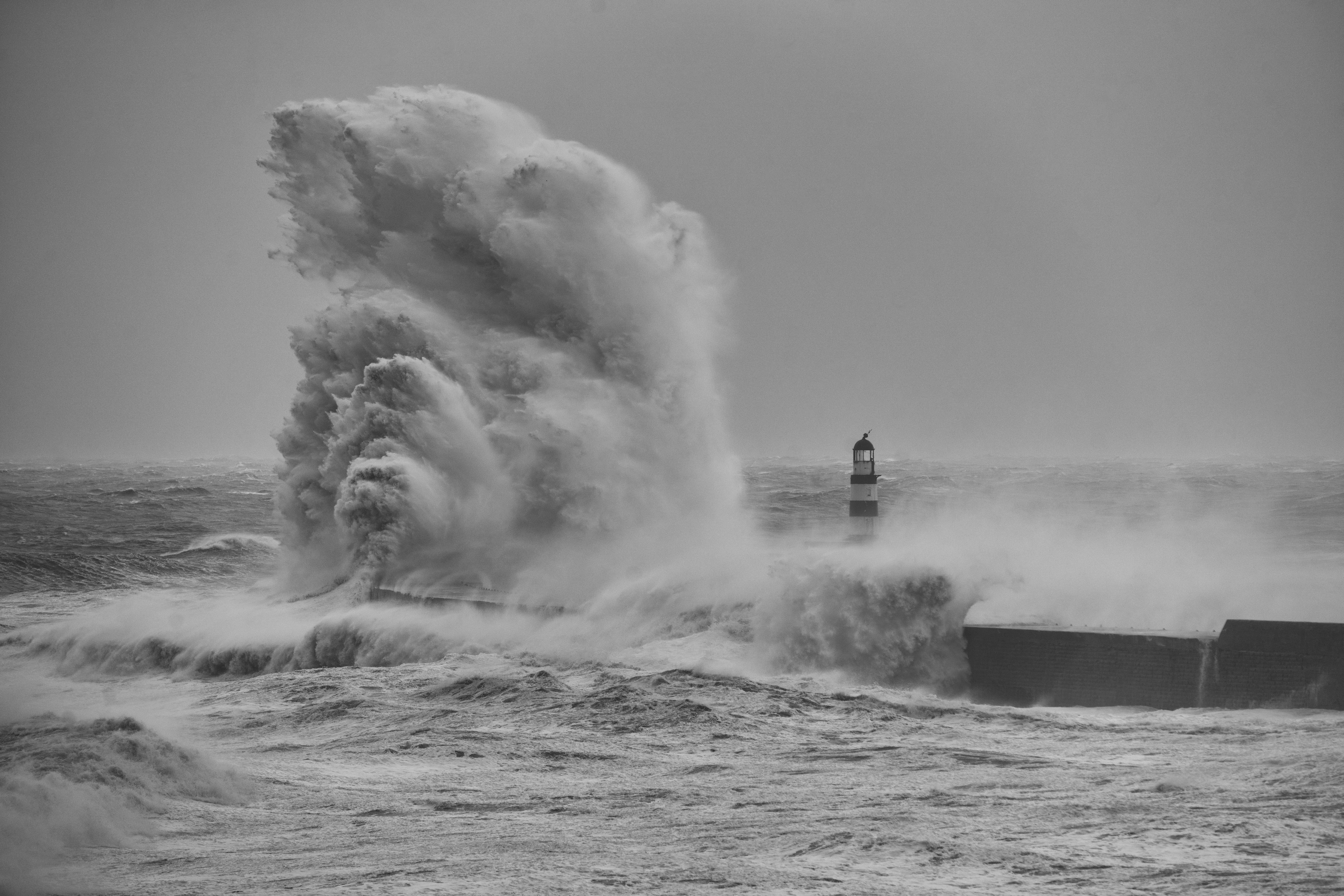 A large wave crashing into a boat photo – Free Storm arwen Image on ...